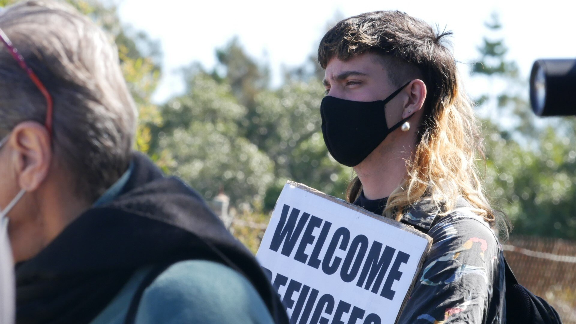 Refugee advocates protest outside Brisbane immigration centre to mark ...