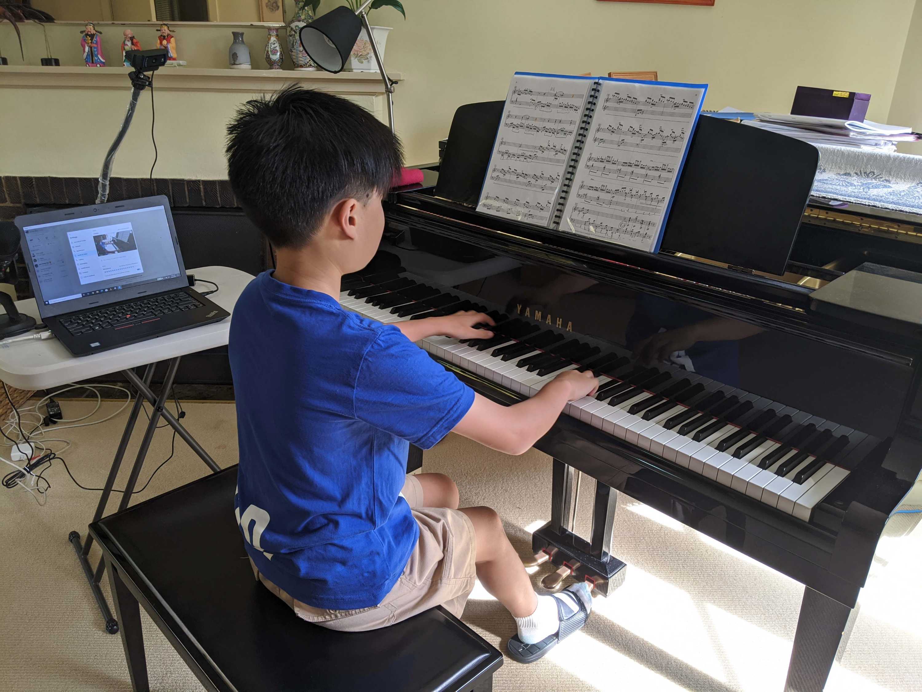 Music teacher Jody Heald explains how piano is taught remotely, with a ...
