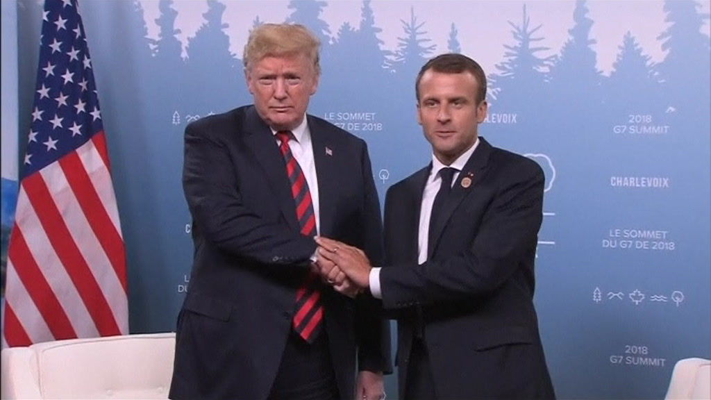 Trump and Macron share strong handshake - ABC News