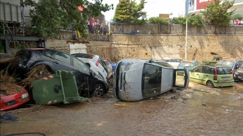 Flash floods in Athens overturns cars - ABC News
