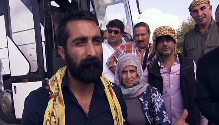 Islamic State: Kurds bus across Turkey to besieged Syrian town Kobani ...