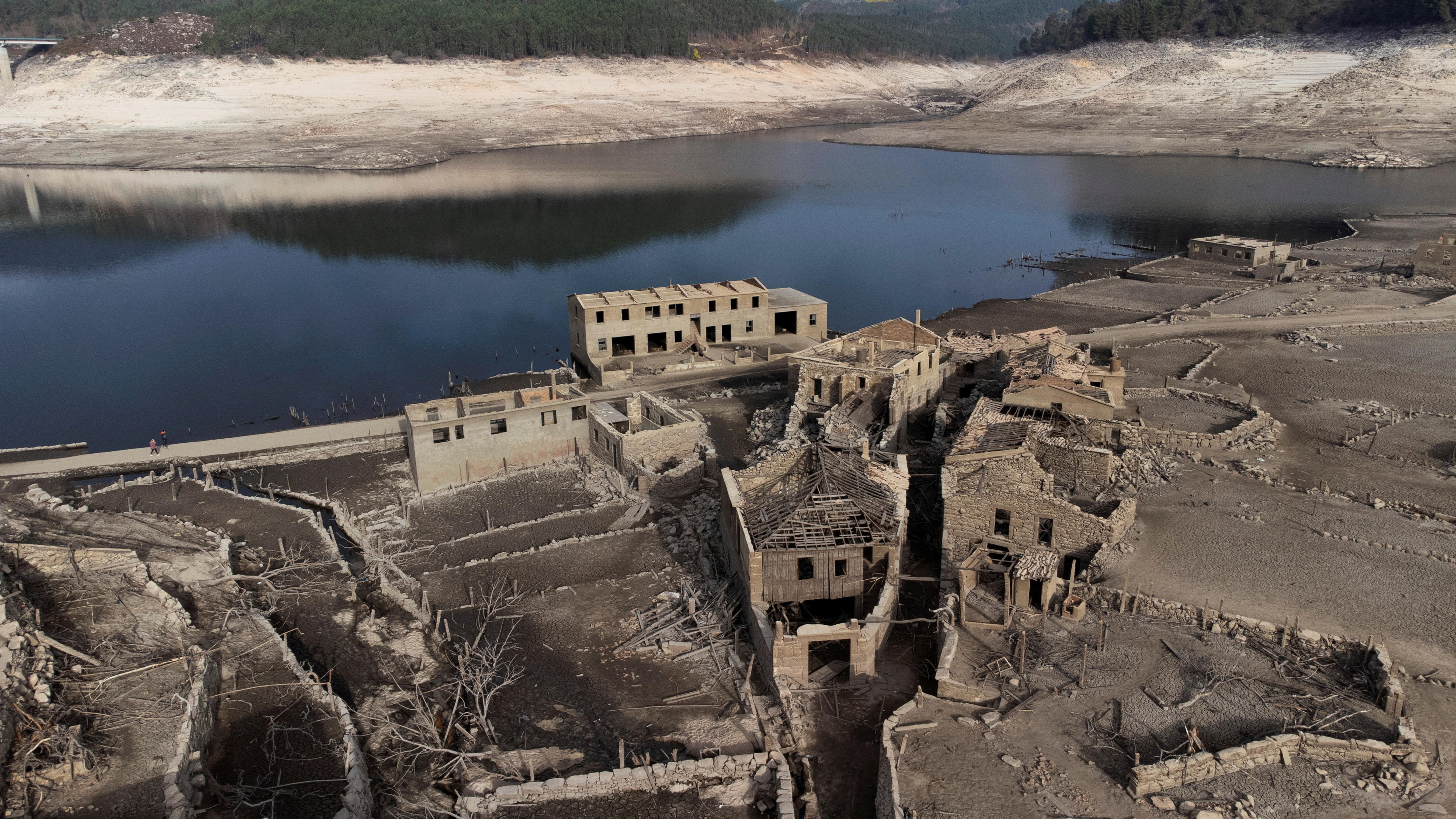 Abandoned village emerges in Spain as drought empties reservoir - ABC News
