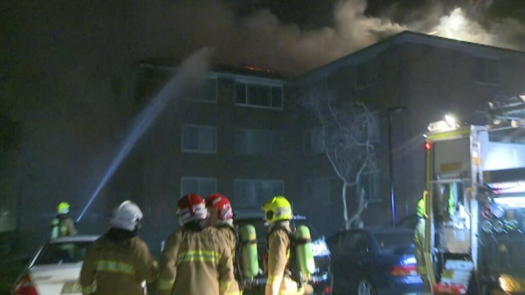 Villawood fire: Residents rescued from top floor of burning unit block ...