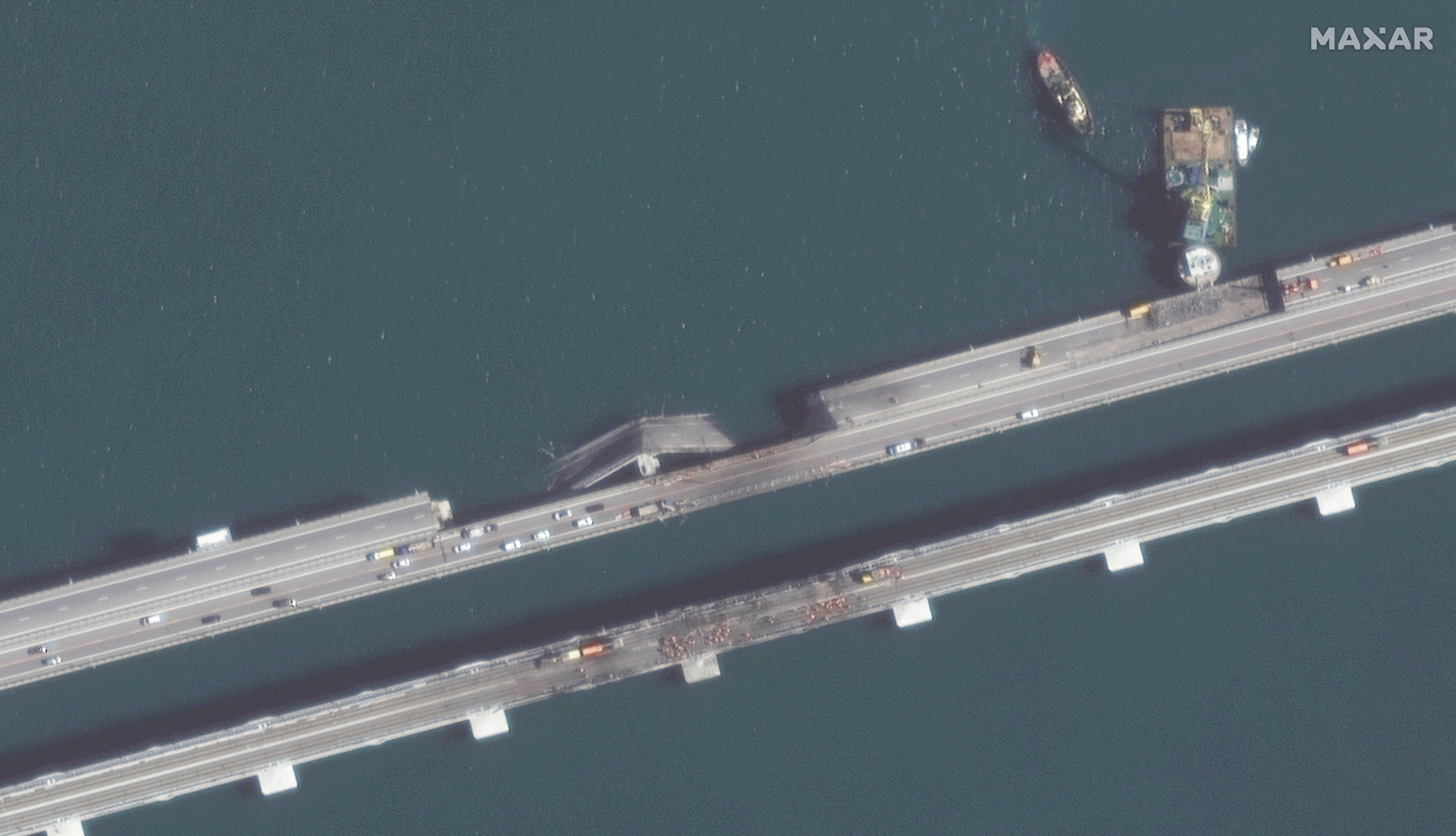 Crimea's Kerch Bridge bombing prompts traffic jam as Russia arrests ...