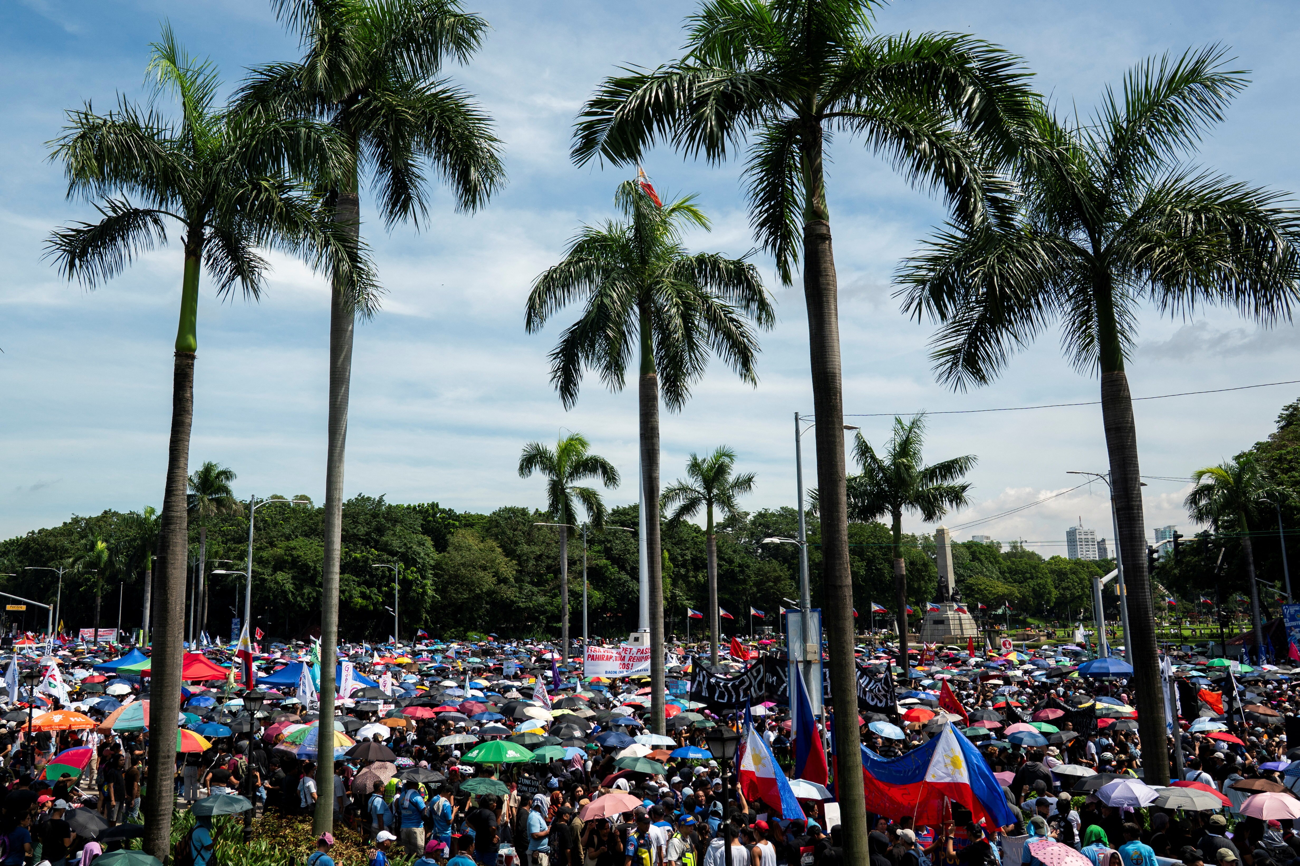 Protesters in Philippines clash with police in rallies against ...