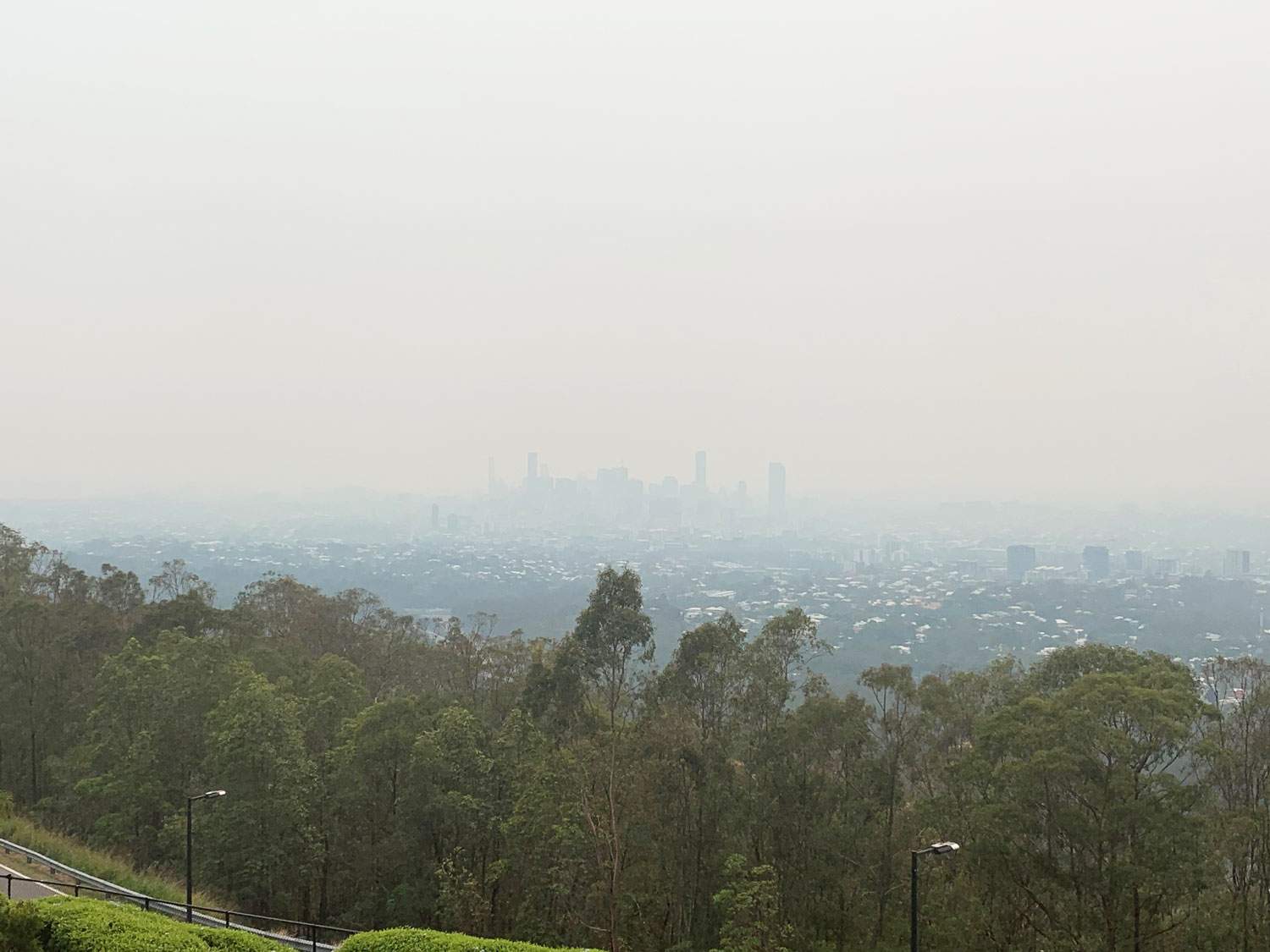Smoke from NSW bushfires blankets south-east Queensland, with rainfall ...