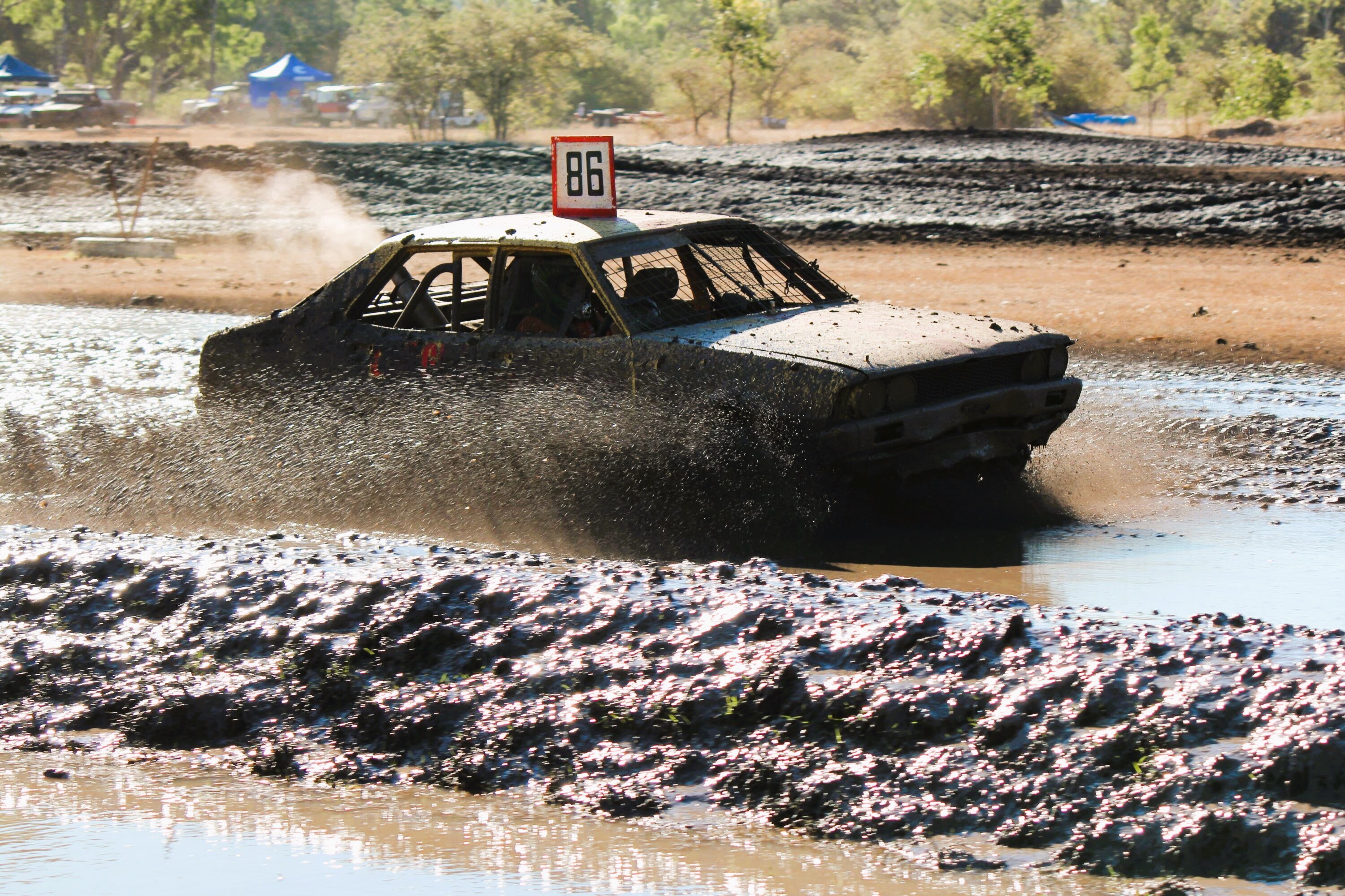 Tiny Queensland country town becomes mud-racing capital of Australia ...