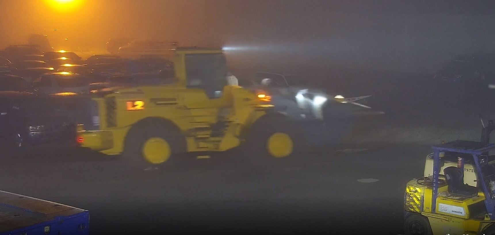 Front-end loader thief smashes into Queensland police holding yard to ...