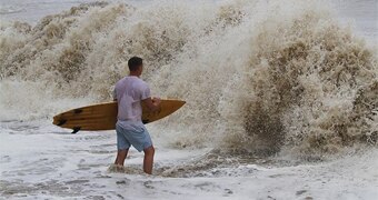 Ex-Cyclone Dylan continues to dump heavy rain after making landfall in ...