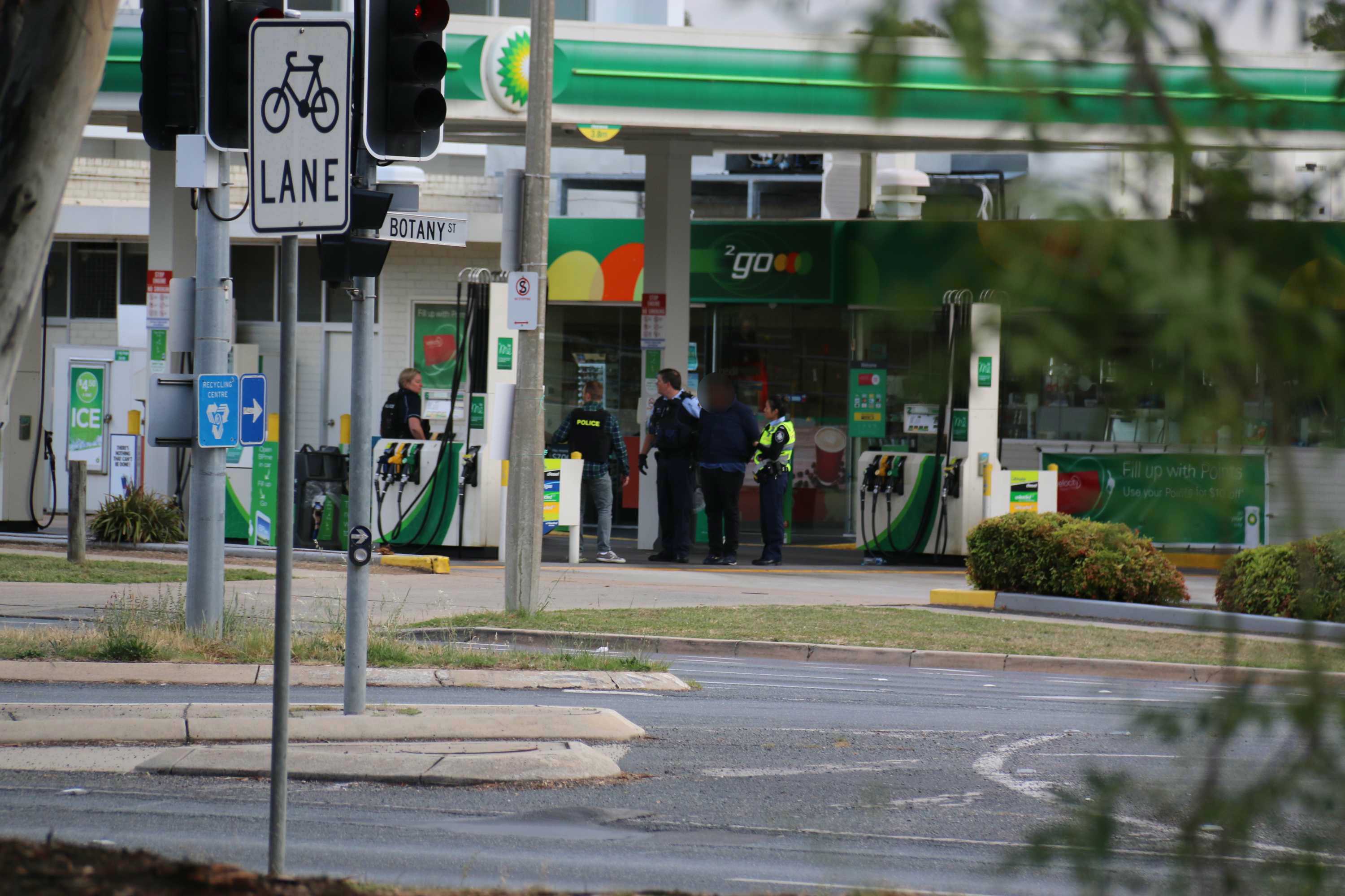 Man arrested after five-hour siege at Canberra petrol station - ABC News