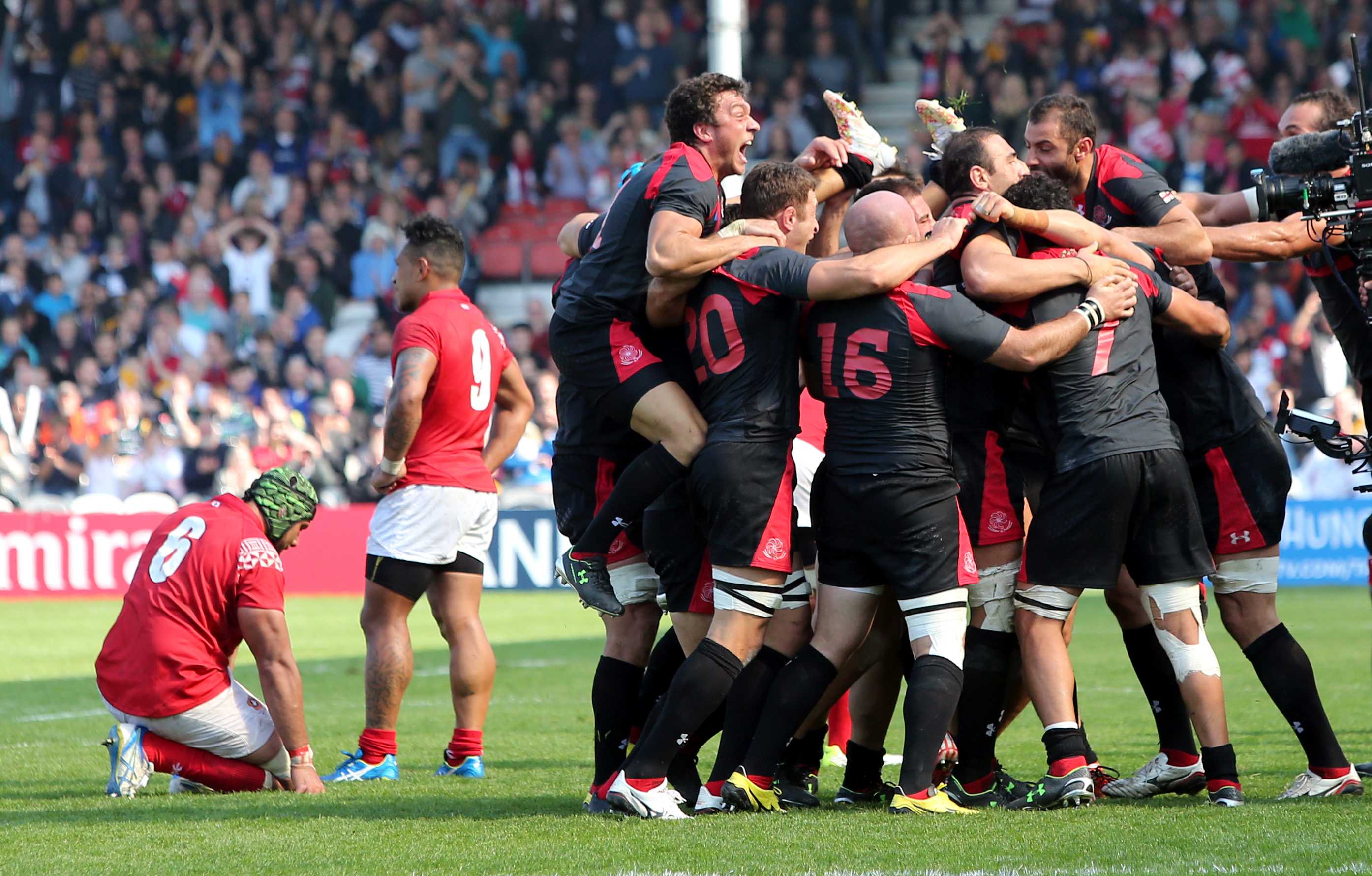 Rugby World Cup: Georgia outmuscles Tonga 17-10 for surprise win - ABC News