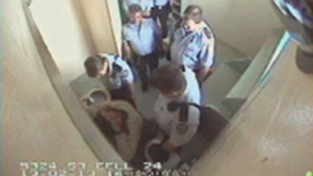 Footage shows 17-year-old prisoner in spit mask and restraints at Wacol ...