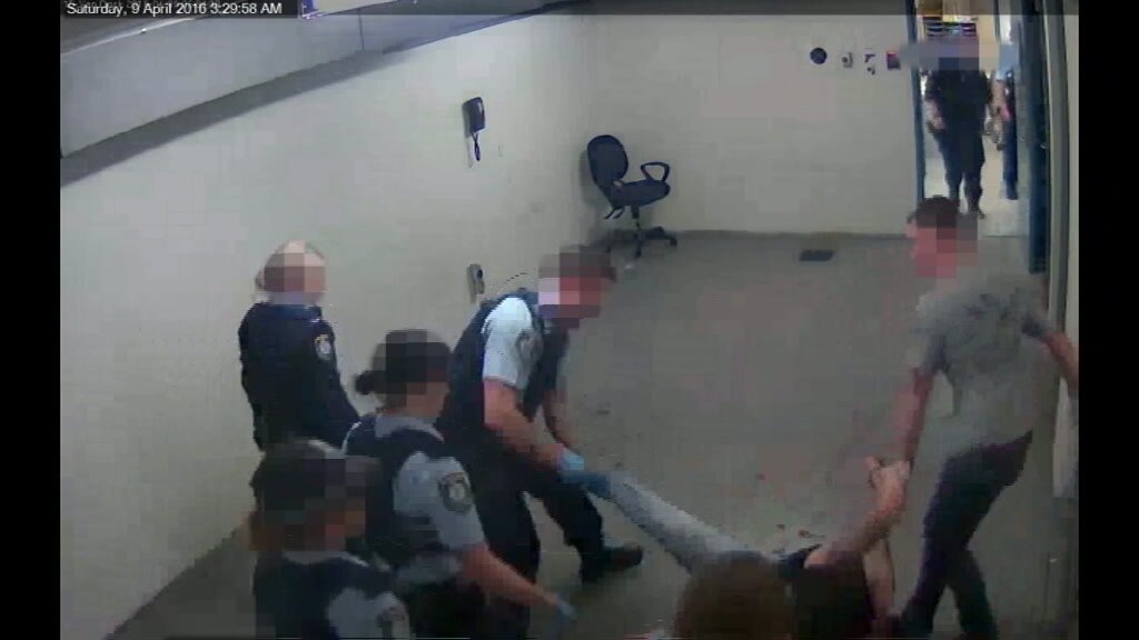 CCTV shows Sydney police officers using 'excessive force' on restrained ...