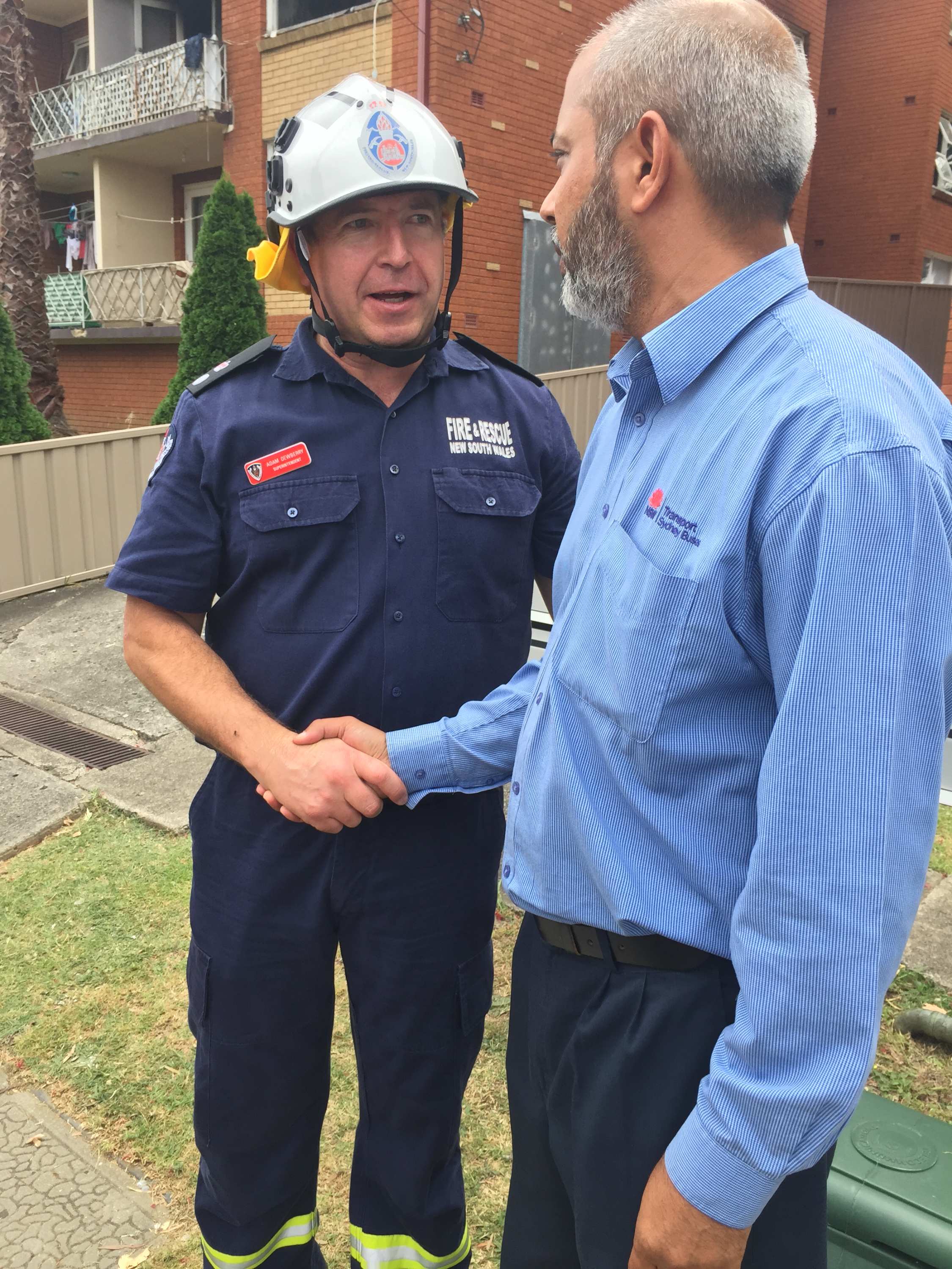 Mother drops baby and toddler from window to escape Lakemba unit fire ...