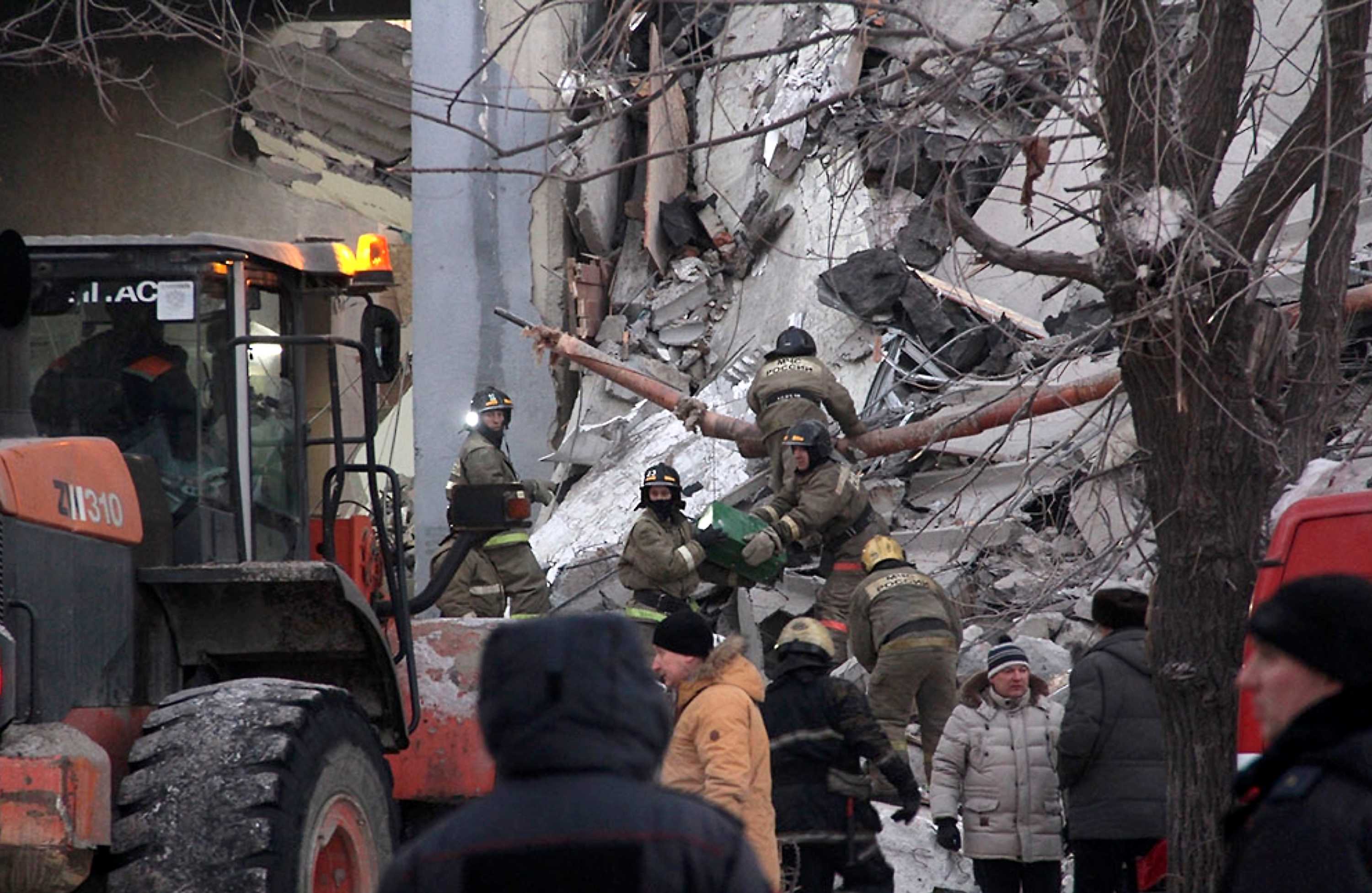 Rescuers scour rubble after Russian tower blast kills at least three ...
