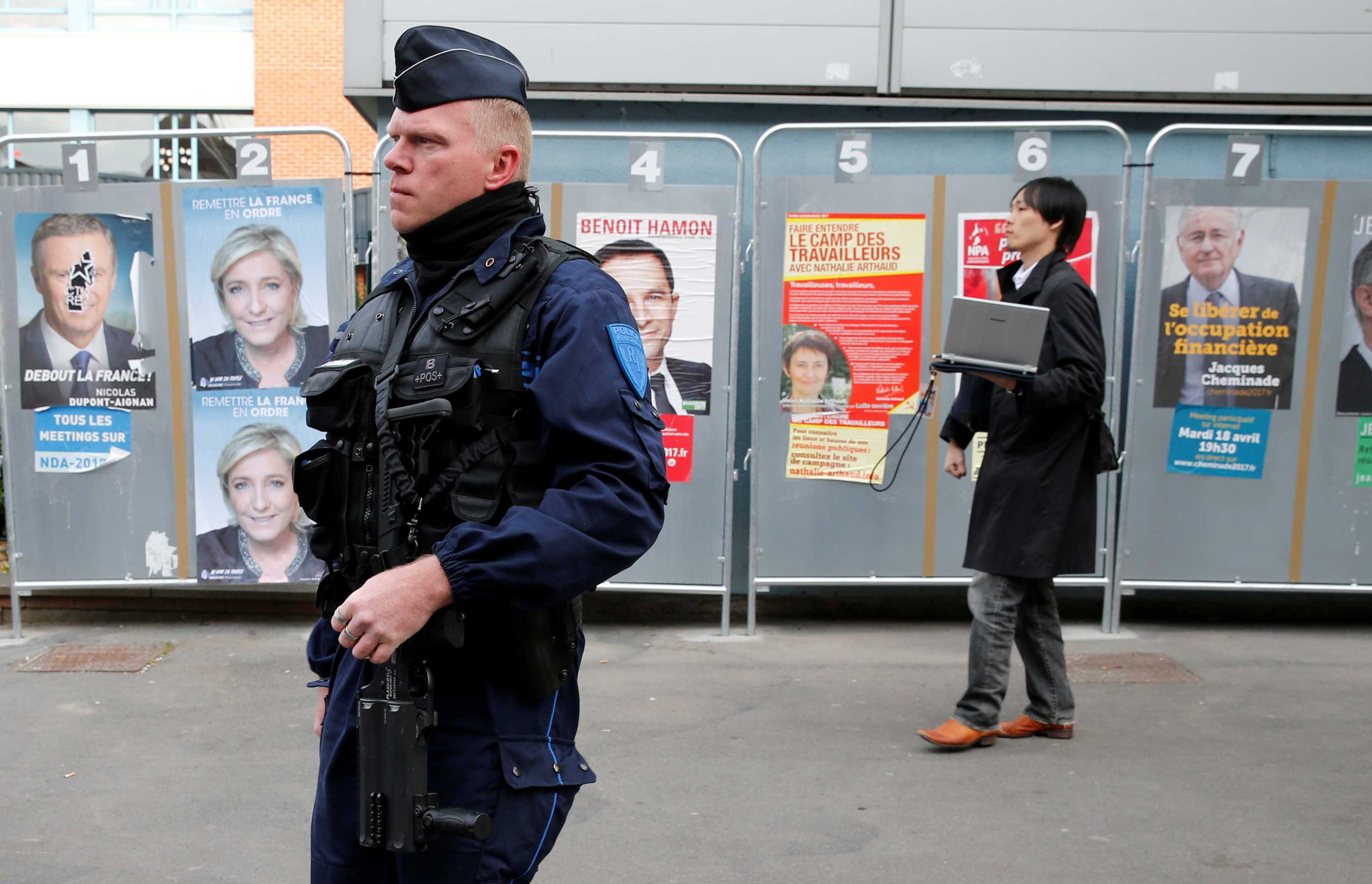 French presidential election polling stations open under heavy security ...