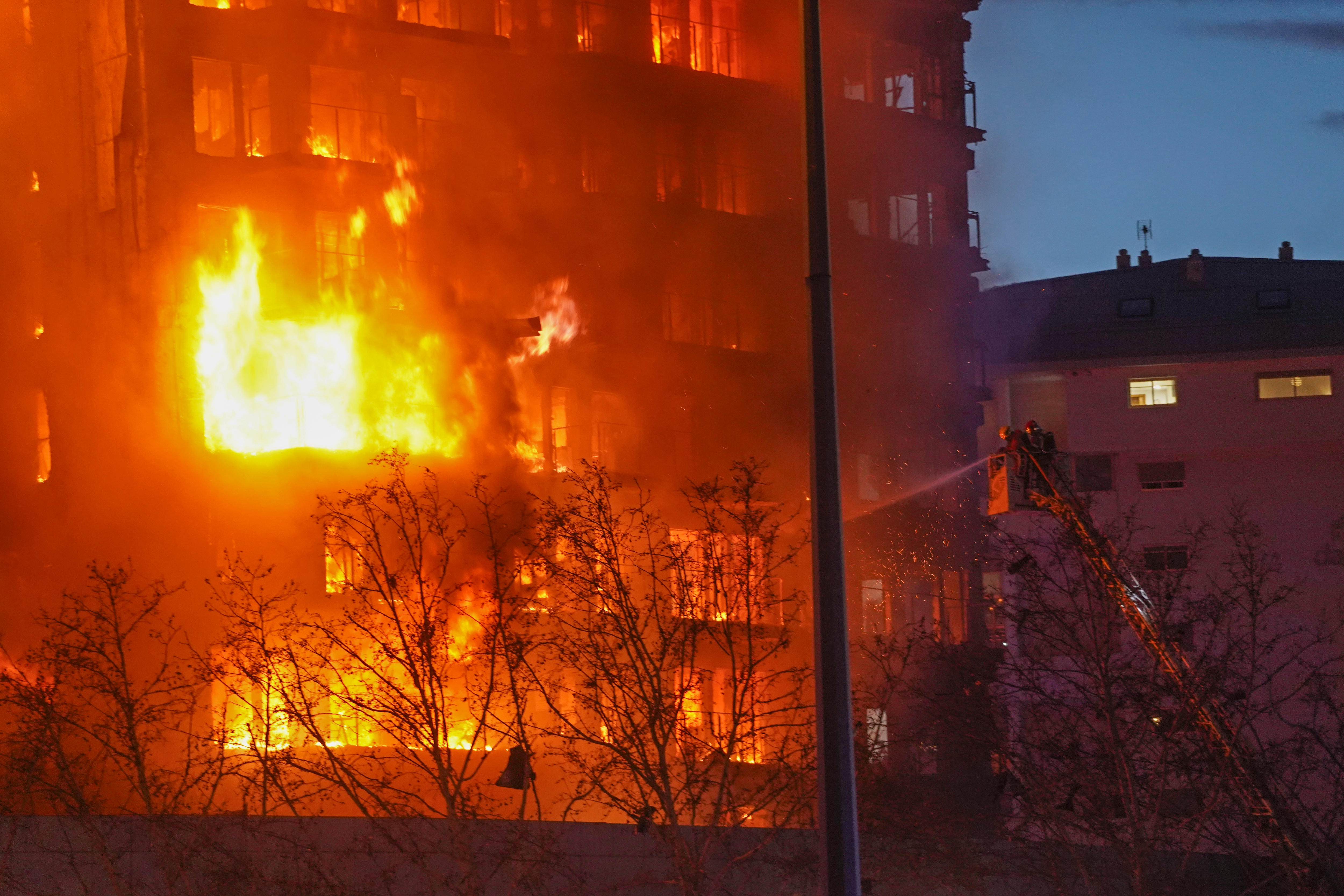 Valencia apartment block fire kills residents on outskirts of Spanish ...