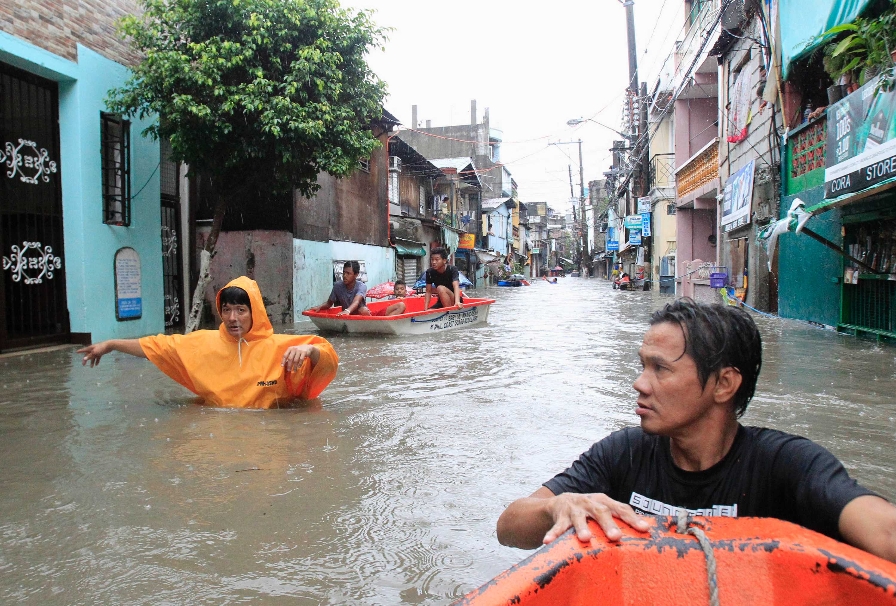 Manila shut down as storm brings heavy downpours to Philippine capital ...