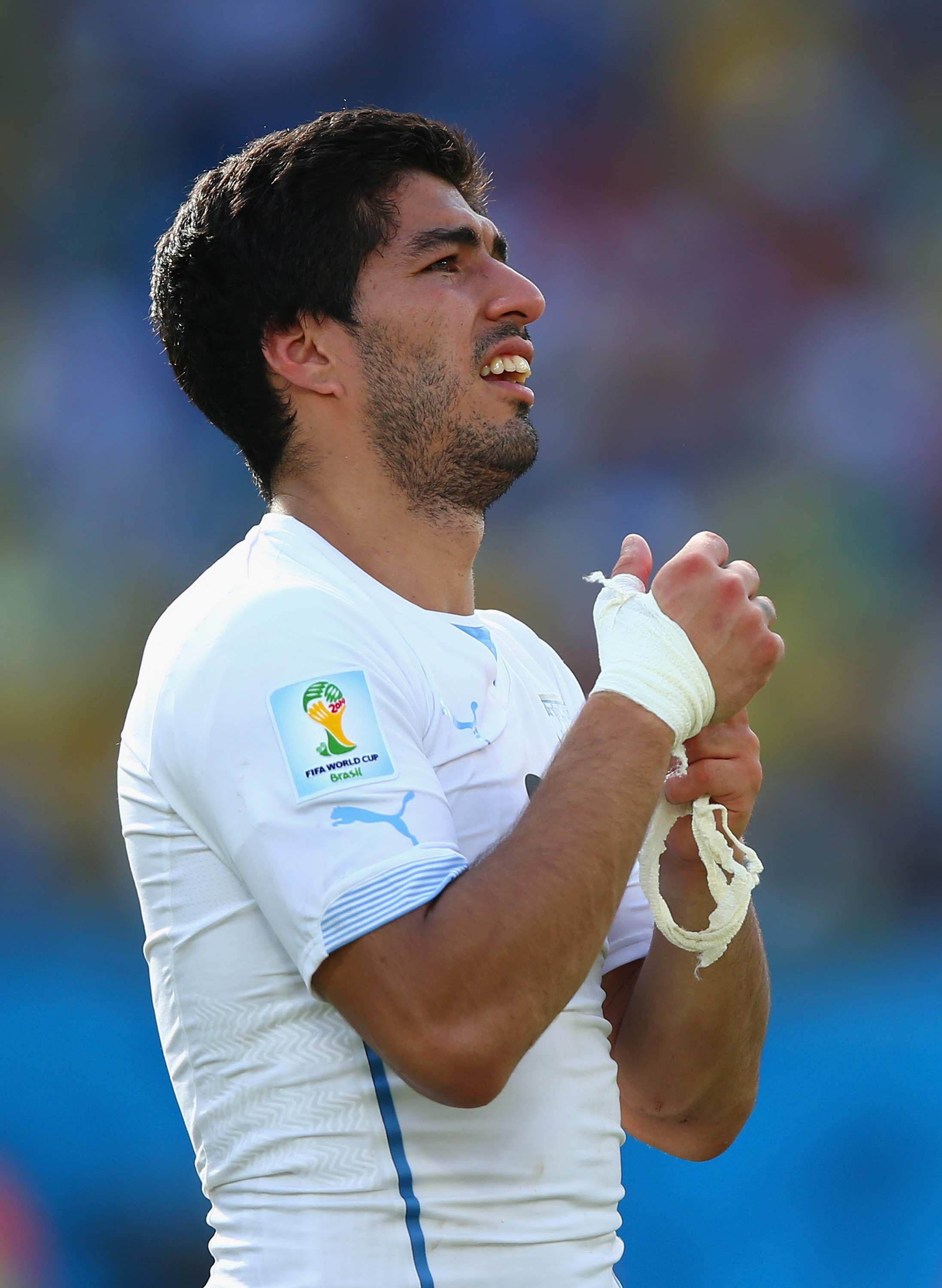 World Cup 2014: FIFA defends harsh punishment for Suarez bite, Uruguay ...