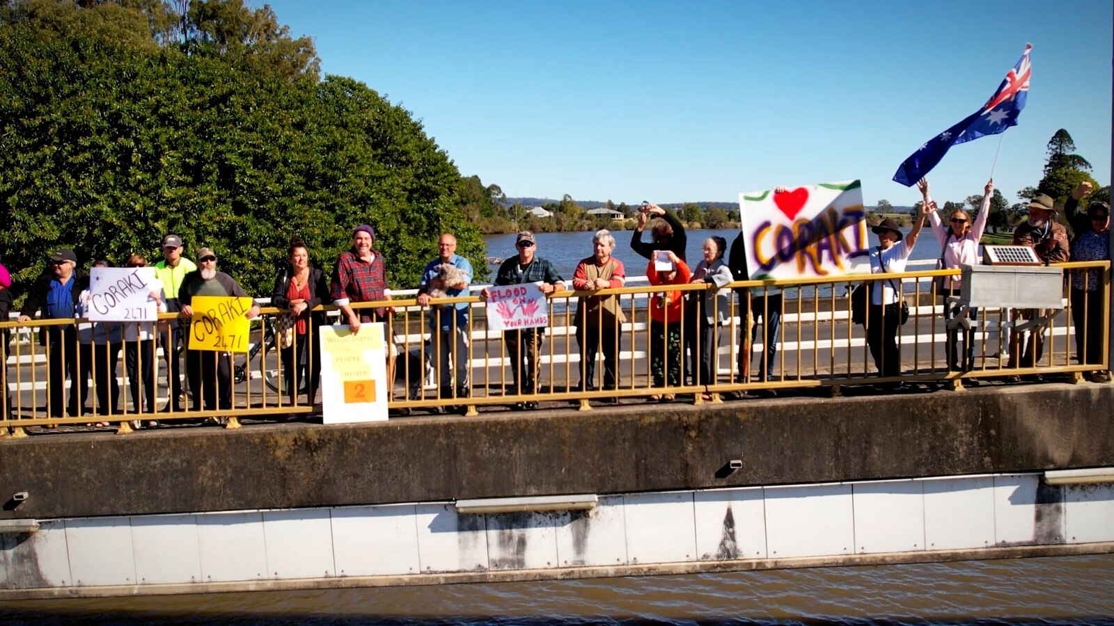 Flood-affected residents from 'invisible' communities rally on iconic ...