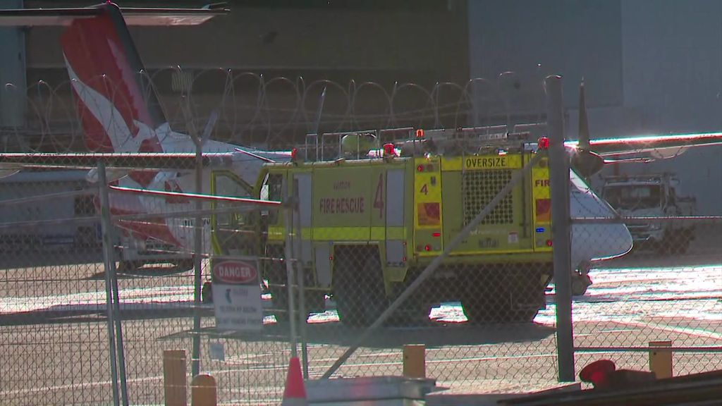 Emergency crews tend to aircraft after flames reported near tyres - ABC ...
