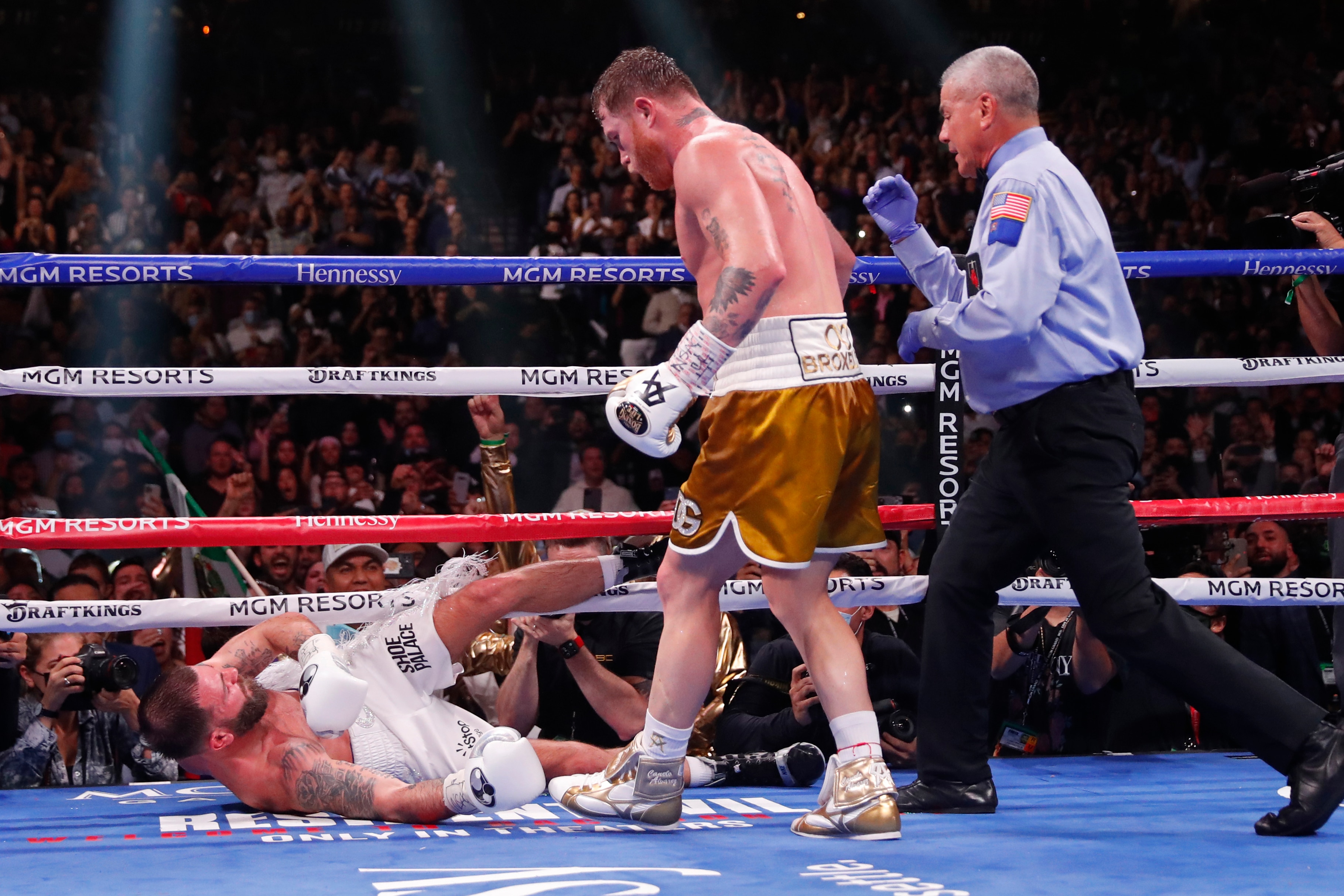 Canelo Alvarez beats Caleb Plant by technical knockout, to be unified ...