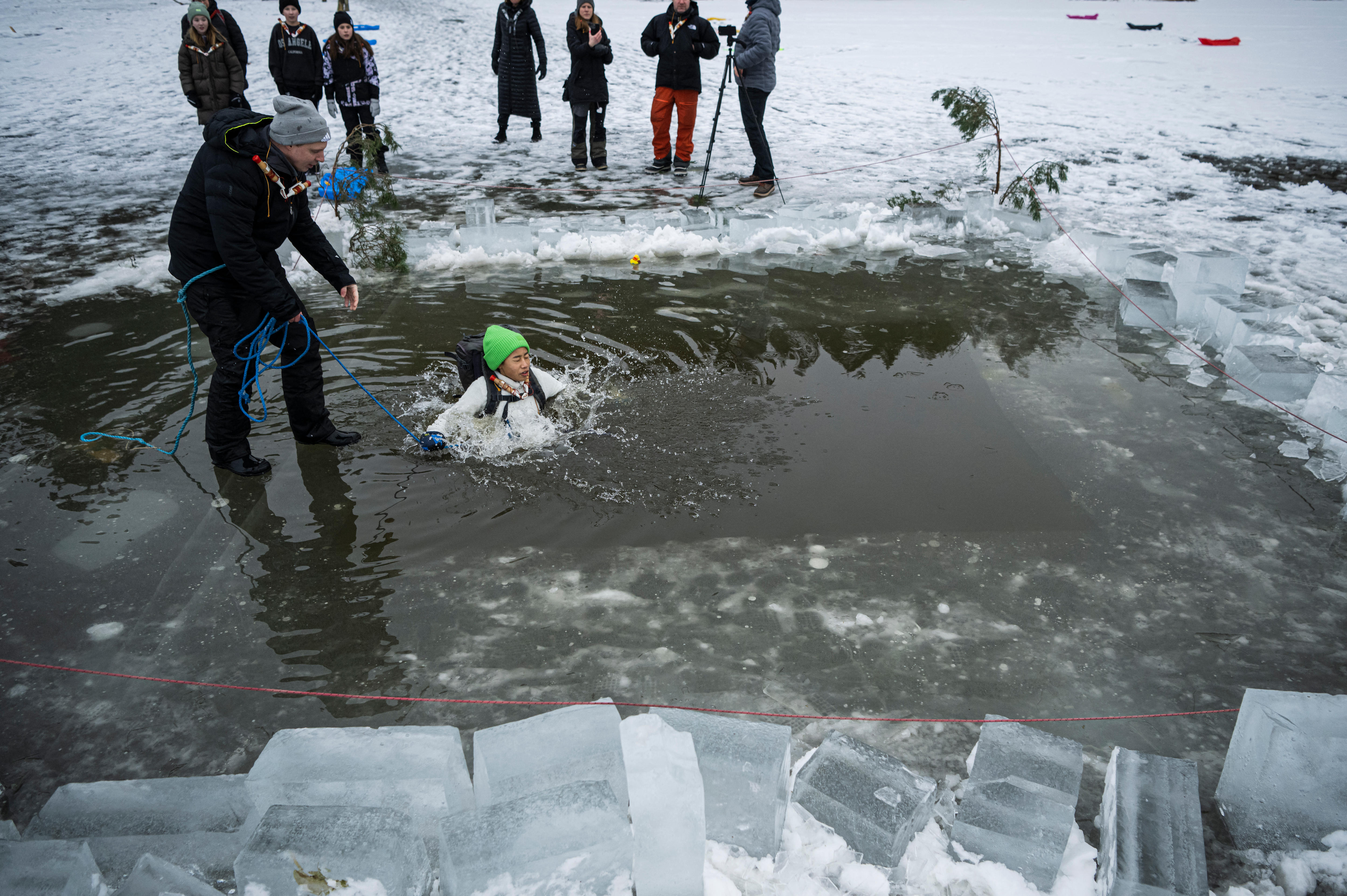 Swedish kids take the plunge in icy lake survival lessons - ABC News