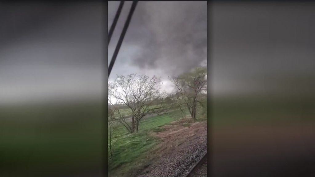 Footage captures moment tornado makes contact with train - ABC News