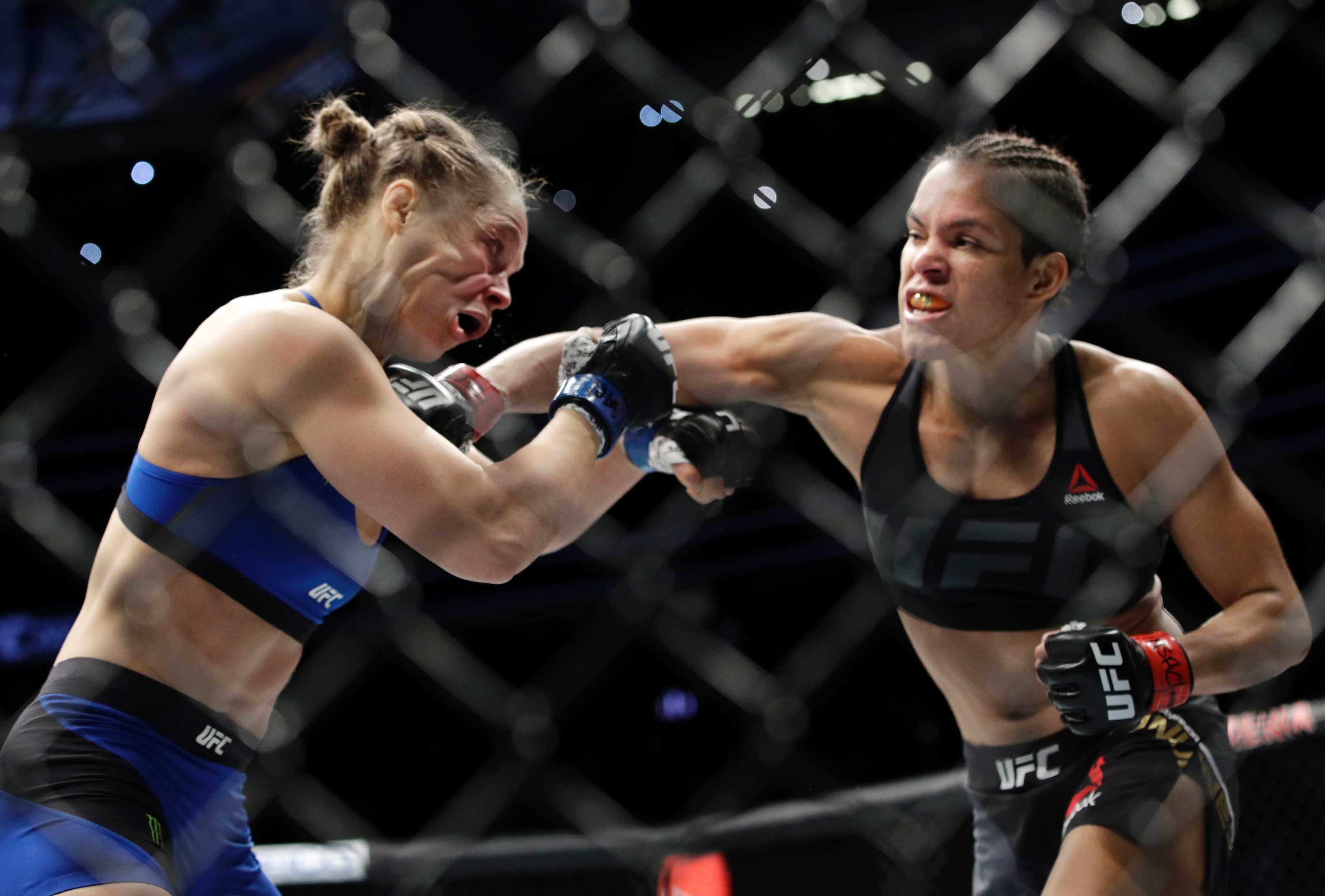 Ronda Rousey's UFC return ends inside a minute as Amanda Nunes keeps ...