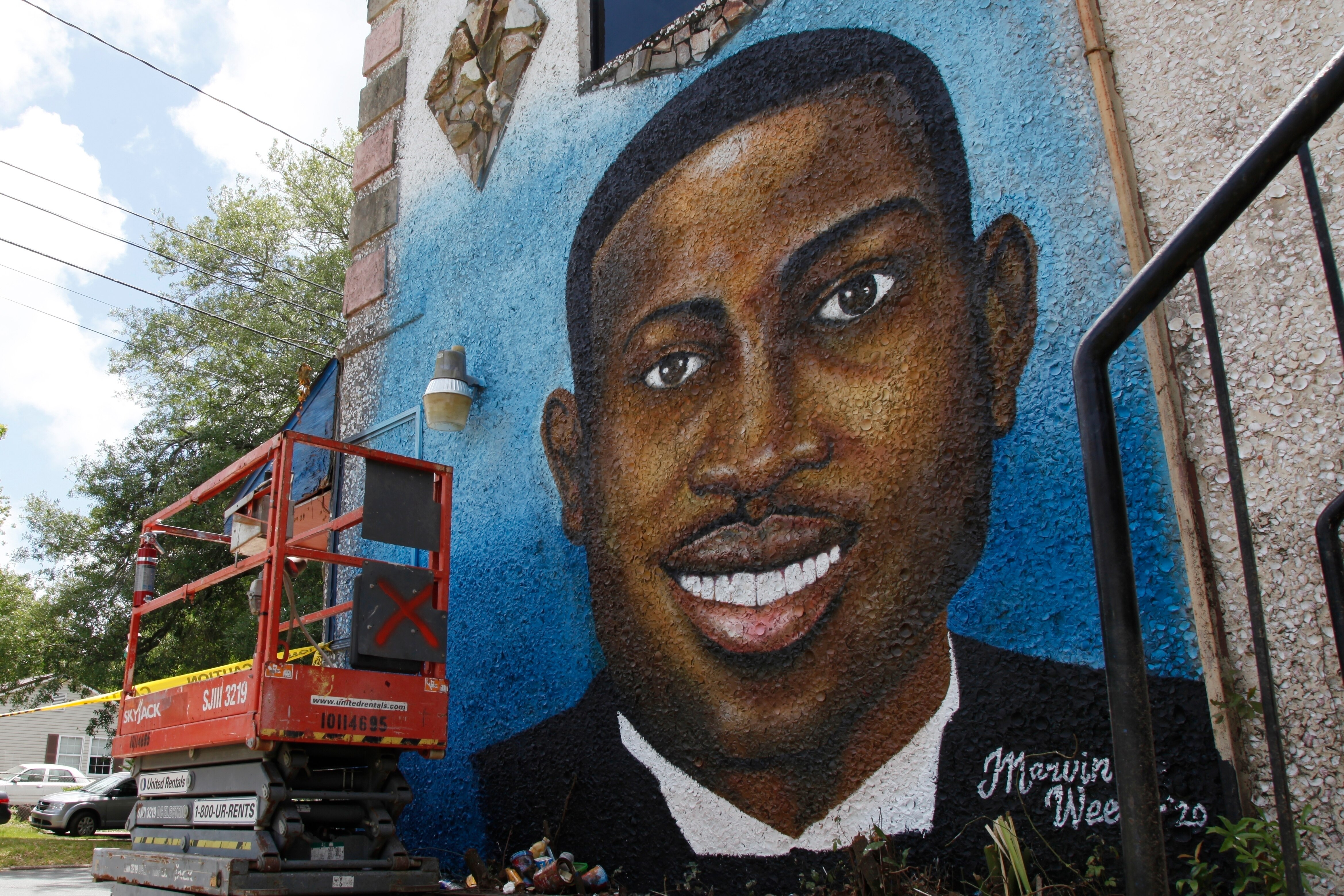 Greg and Travis McMichael jailed for life for hate crime murder of ...