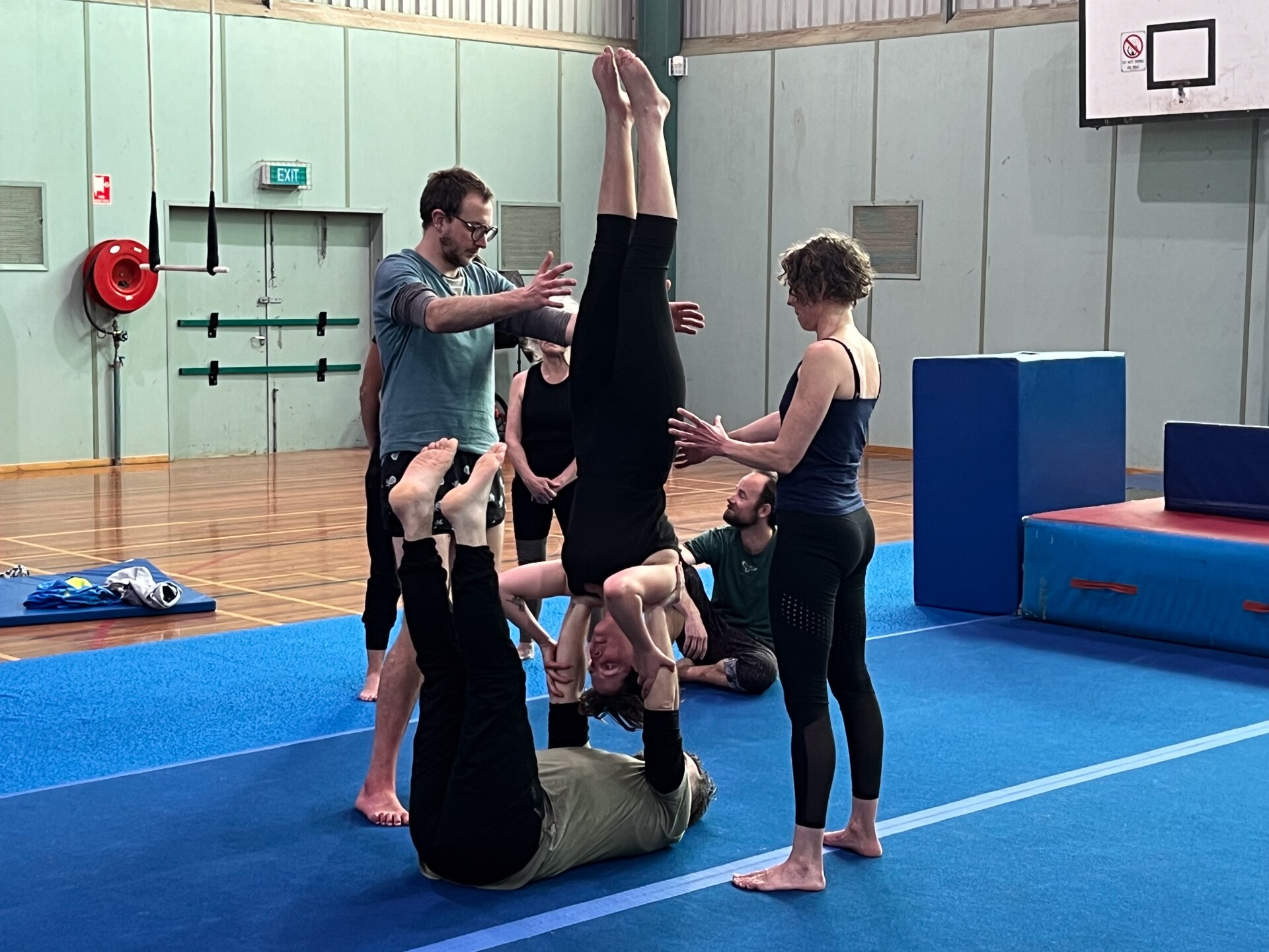 Adults keeping fit through circus skills like aerial and acrobalance ...