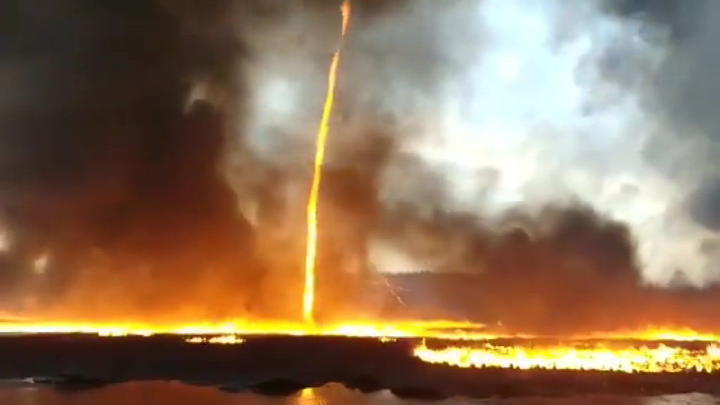 Firefighters battle a rare 'firenado' at plastics factory in the UK ...