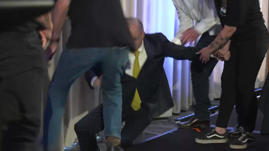 Anthony Albanese trips and falls off stage - ABC News