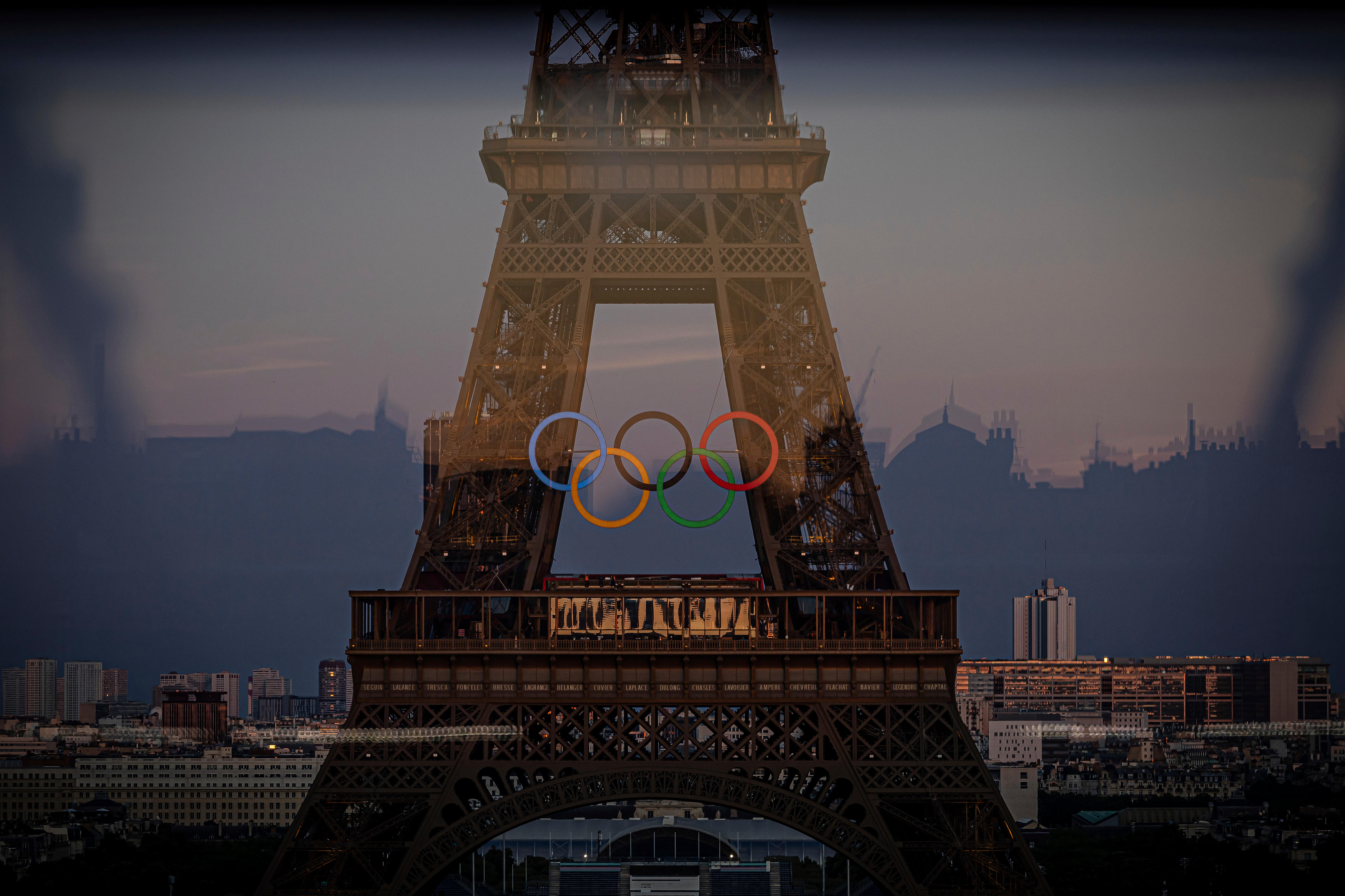 At the Paris Olympics opening ceremony, who's bearing the flag for ...