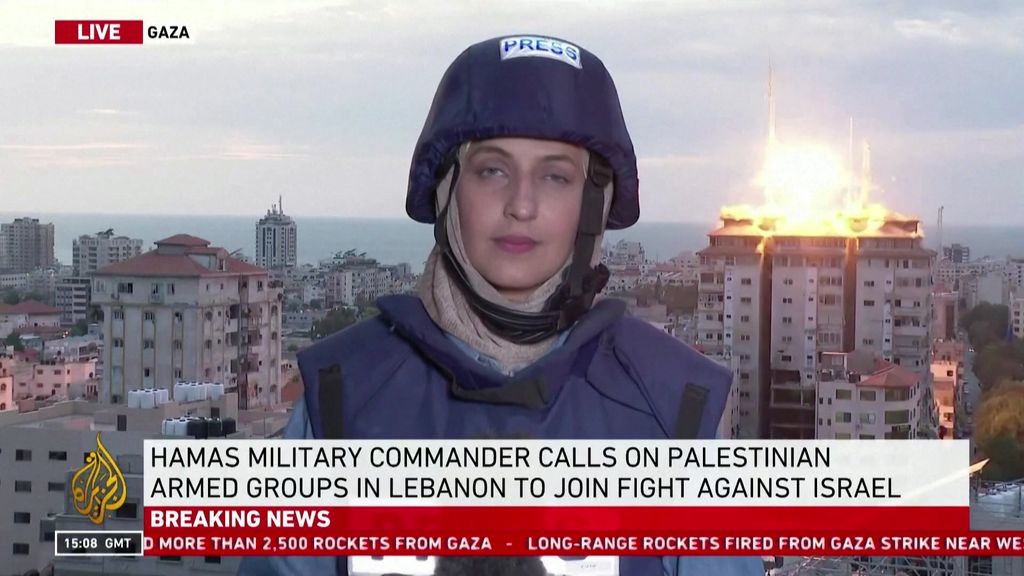 Israeli air strike hits tower during journalist's live cross - ABC News