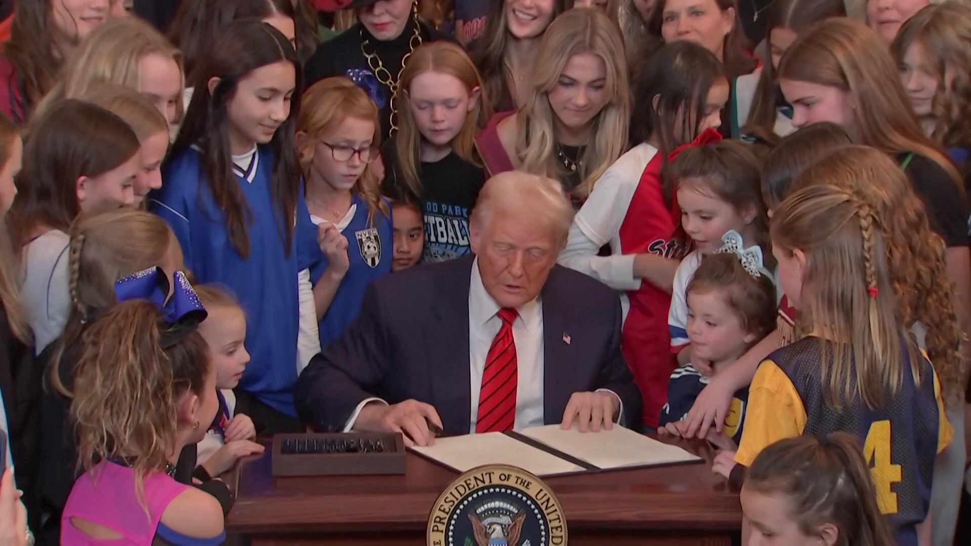 Trump signs order restricting trans women playing in women's sport ...