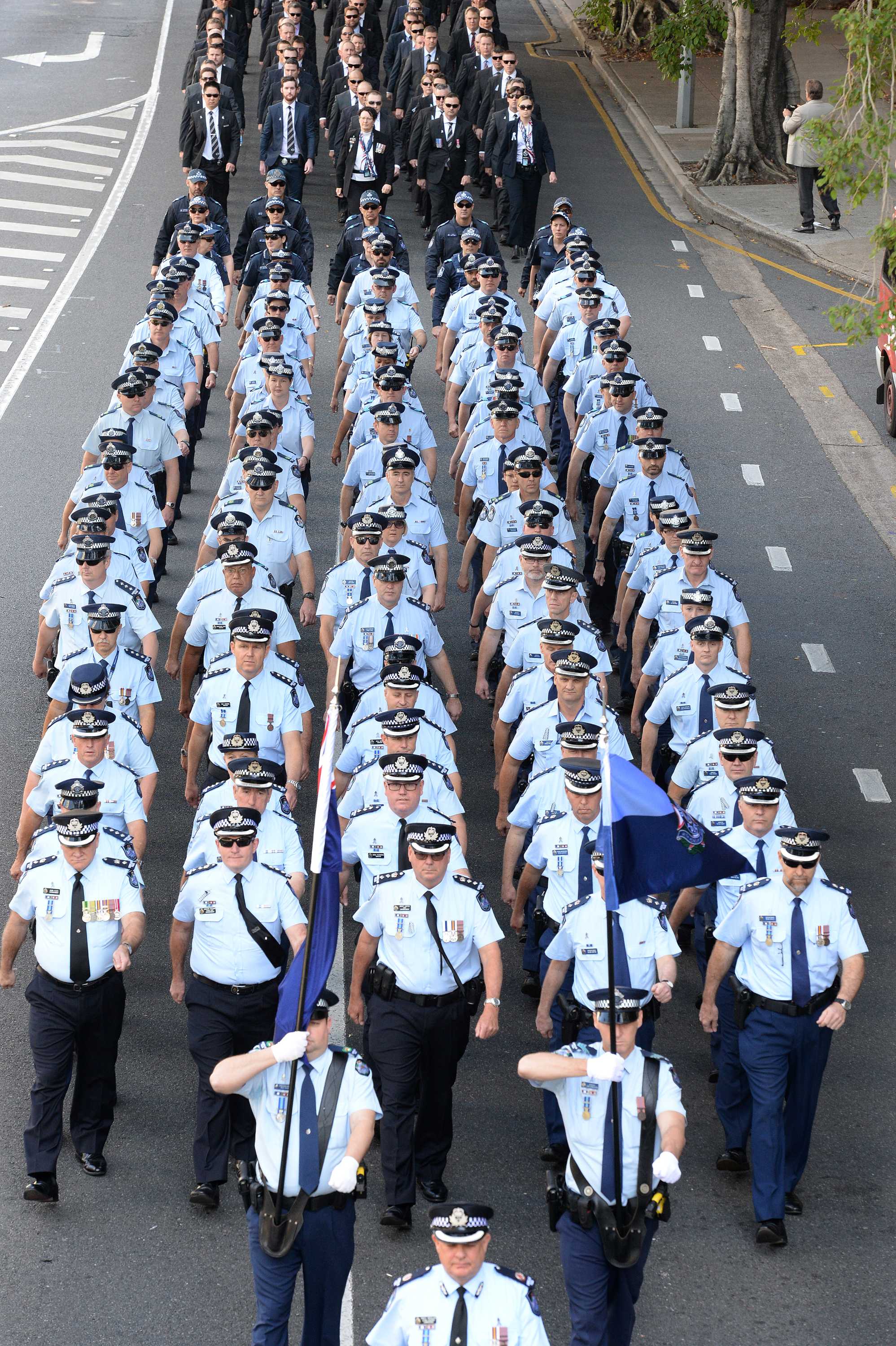 Police march in remembrance of fallen comrades amid rising security ...