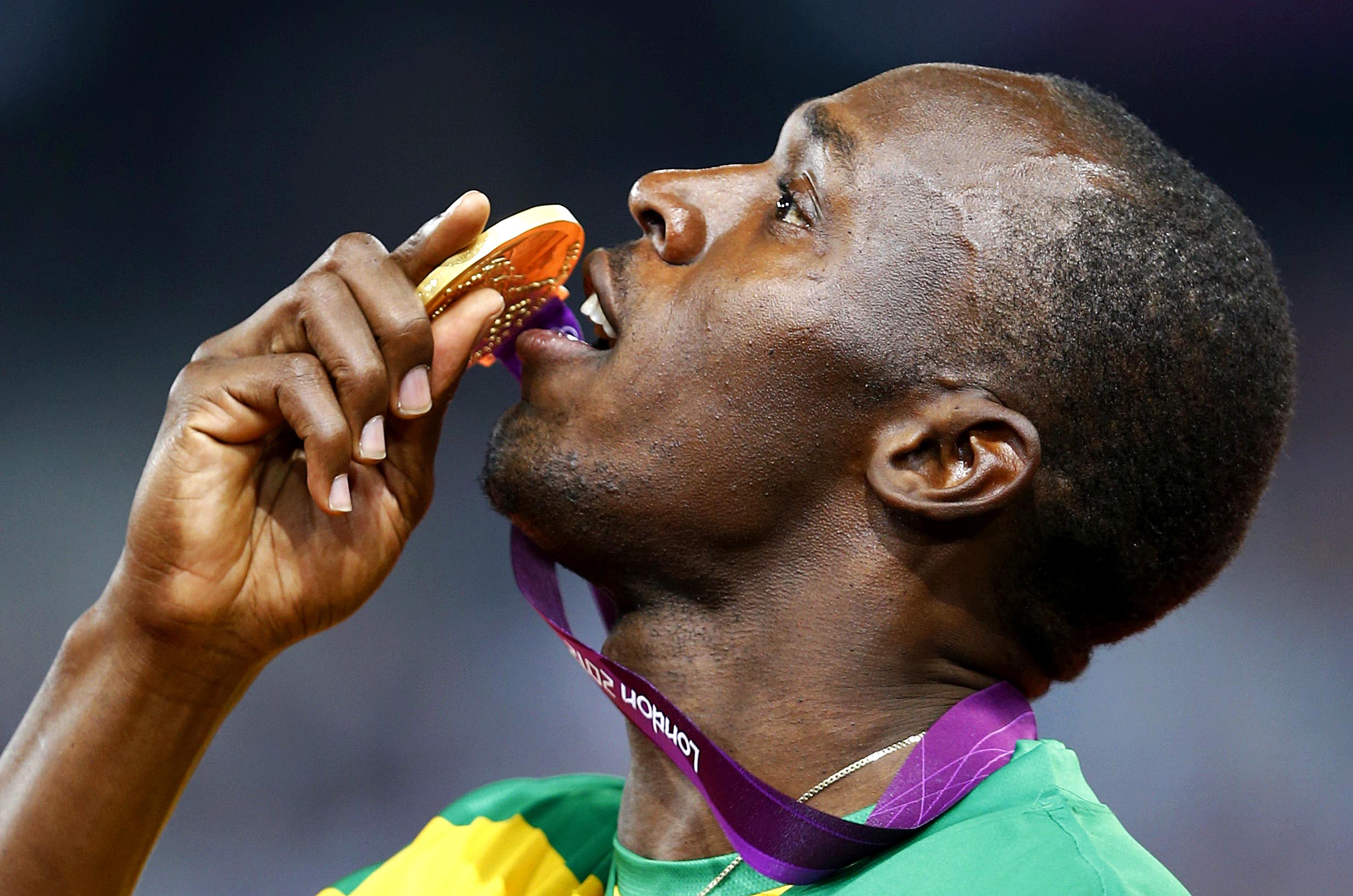 Bolt sprints into Olympic history - ABC News