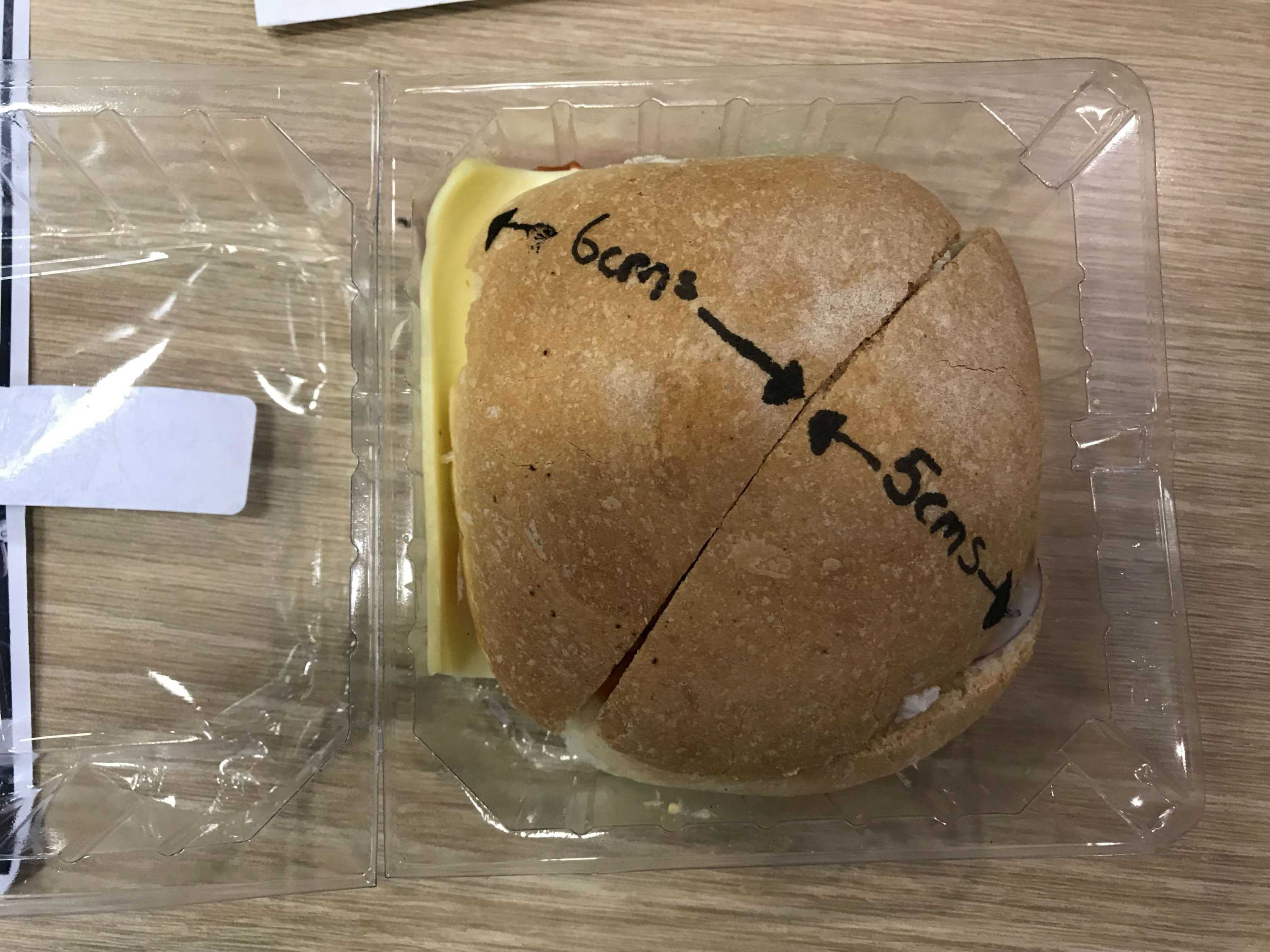 Not-quite-halved bread roll prompts bitter bun battle between patrons ...