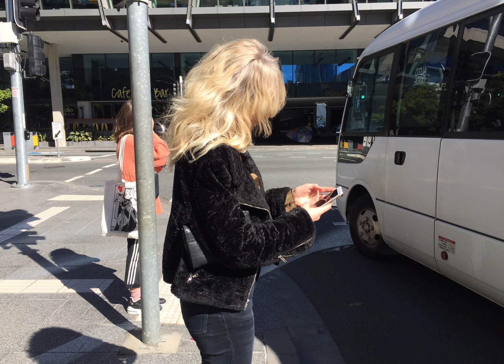 RACQ says phones and roads a deadly combo, calls for pedestrian ...