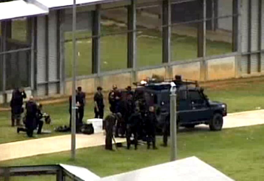 AFP denies claims riot squad was withdrawn from Christmas Island to ...