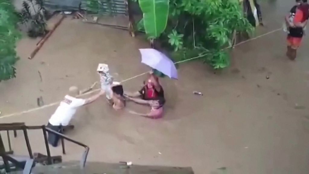 Philippine rescue teams race to evacuate people hit by flash floods ...