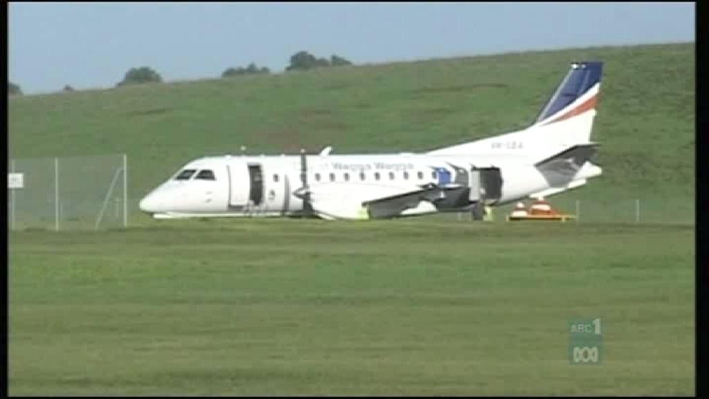 Passenger plane lands in mud - ABC News