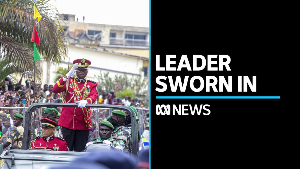 Gabon coup leader sworn in as interim president in front of cheering ...