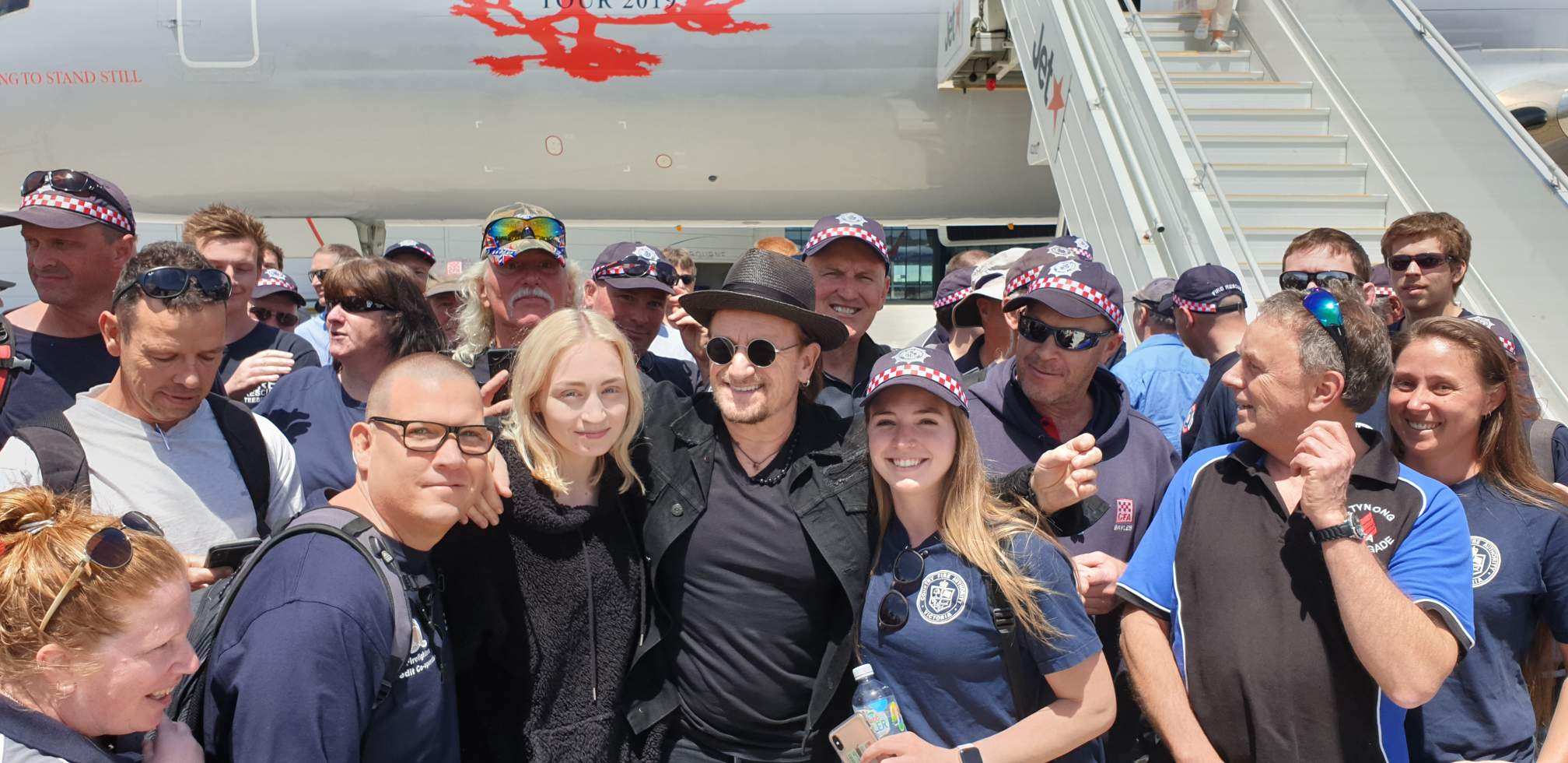 Victorian firefighters meet U2's Bono on the way to fight NSW bushfires ...