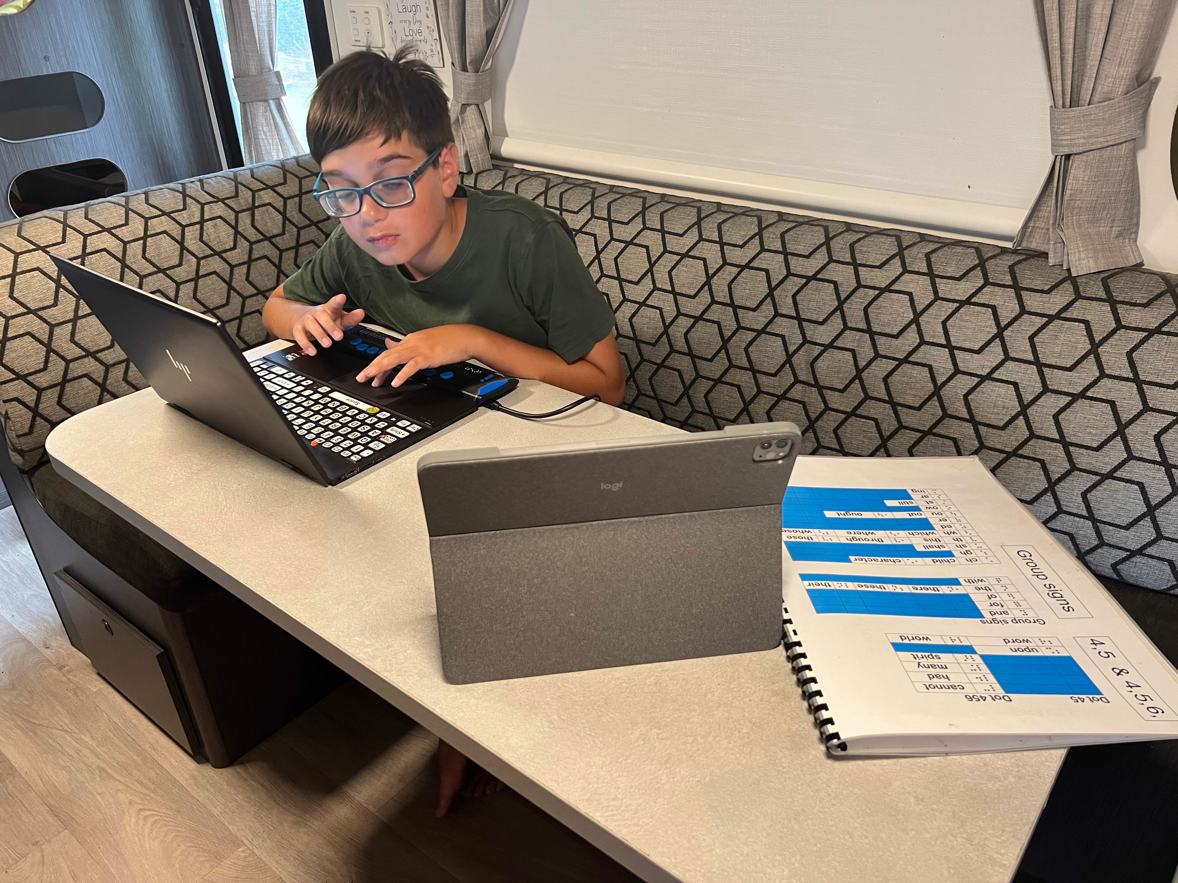 Riley Cross began learning braille from home but his tutor helped take ...