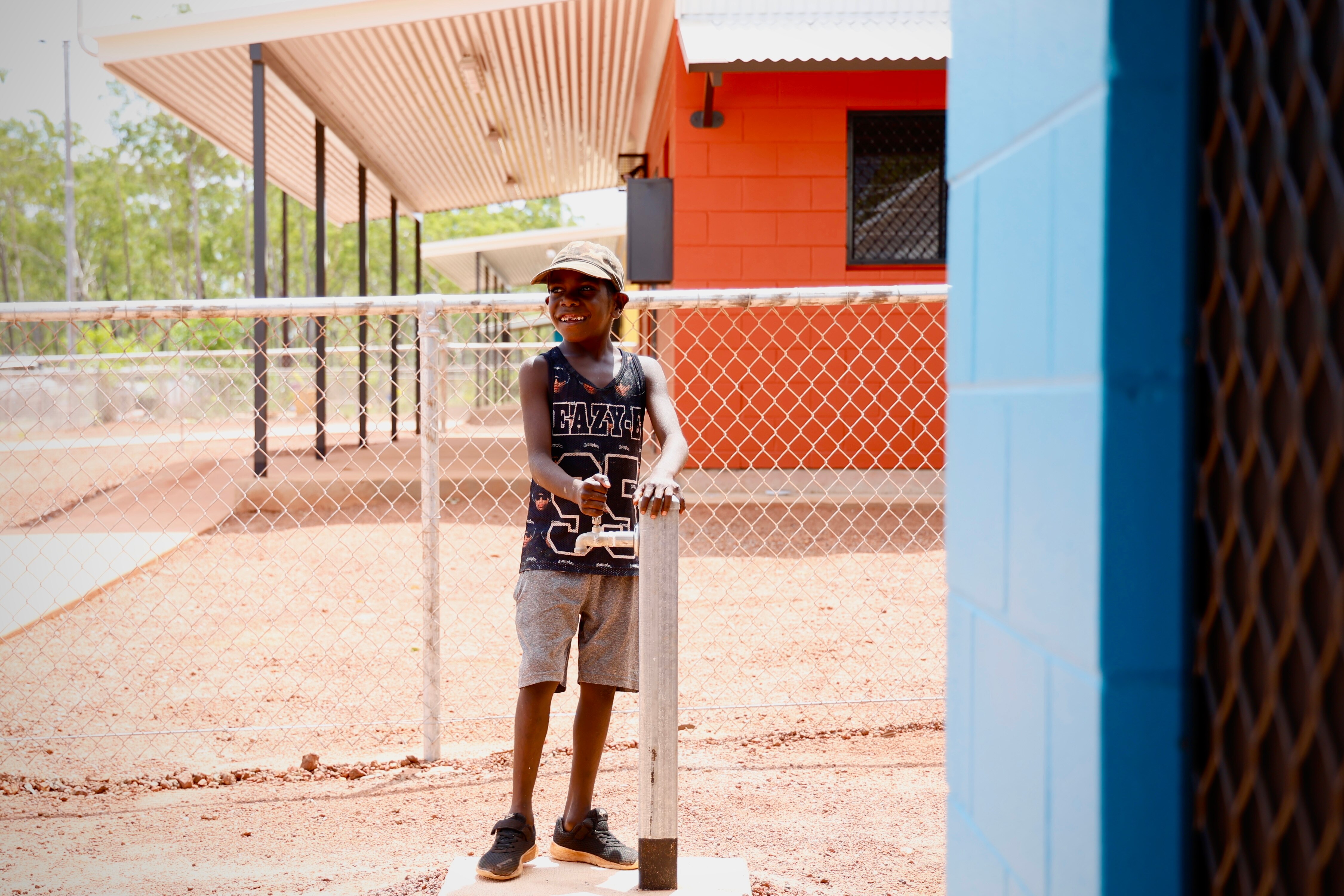 Families all smiles as NT reaches landmark in remote housing project ...
