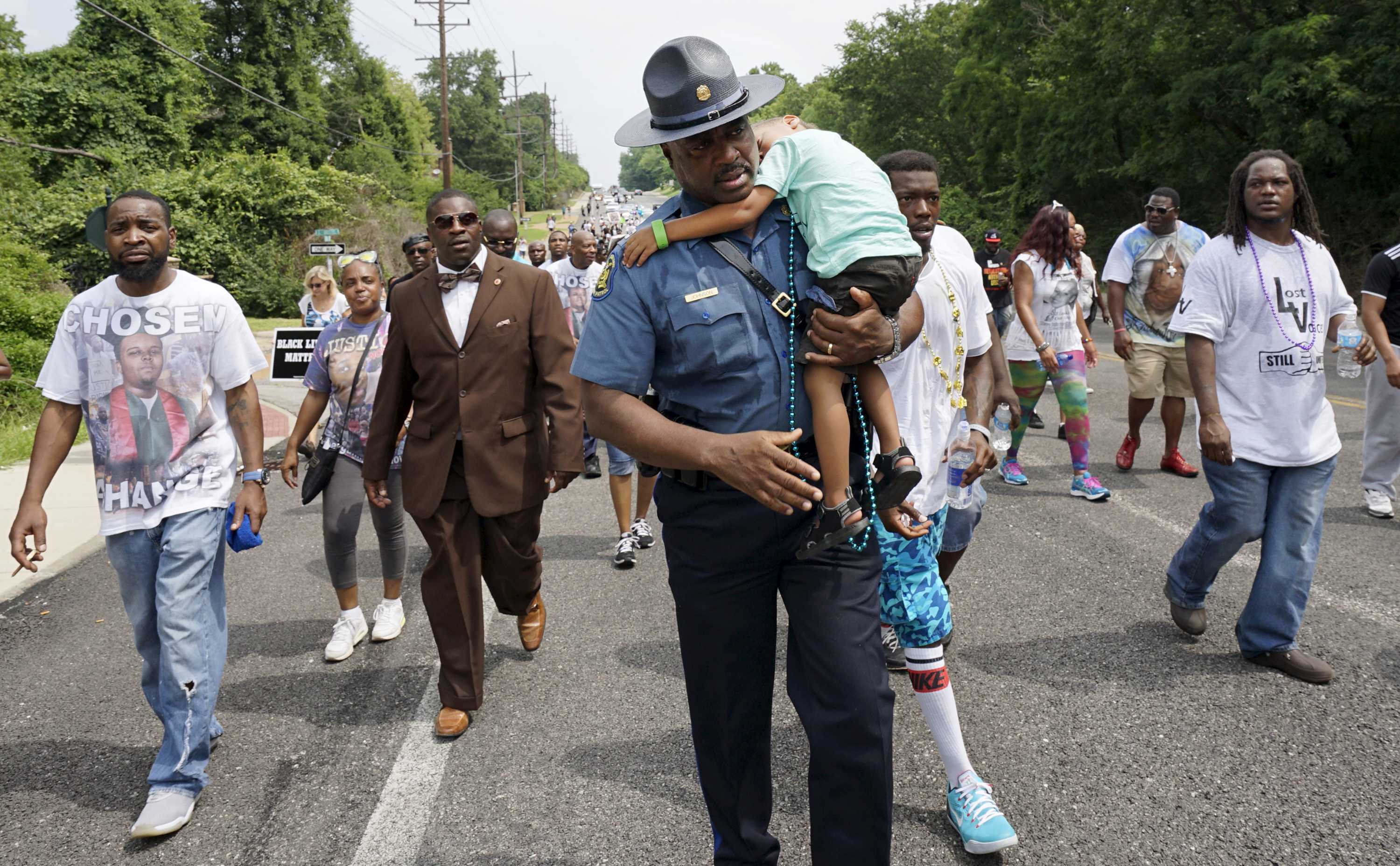Ferguson shooting anniversary: Community remembers death of unarmed ...