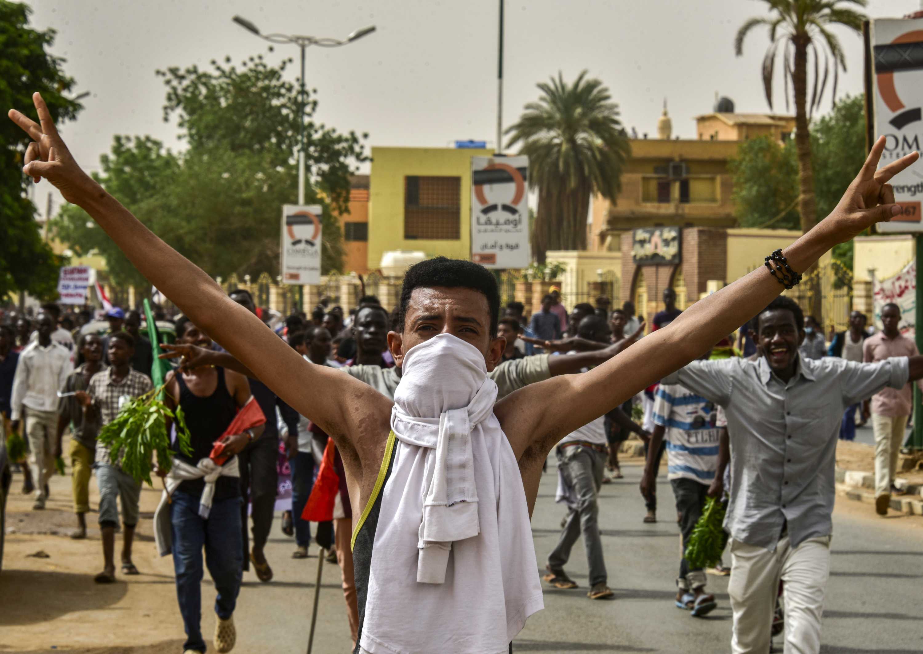 Seven killed in Sudan as tens of thousands stage protests against ...