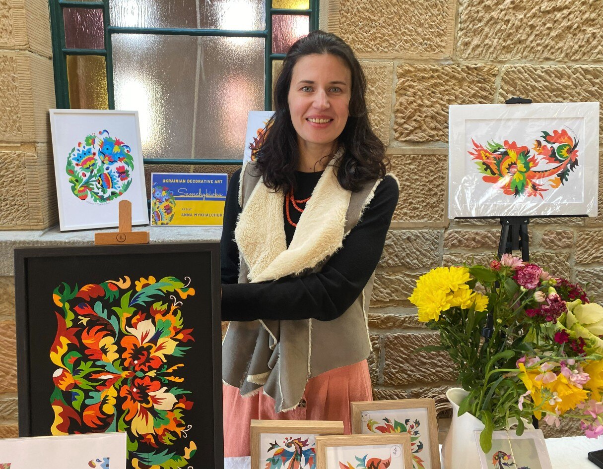 Esteem cafe opens doors and arms to Hobart migrants keen to learn ...